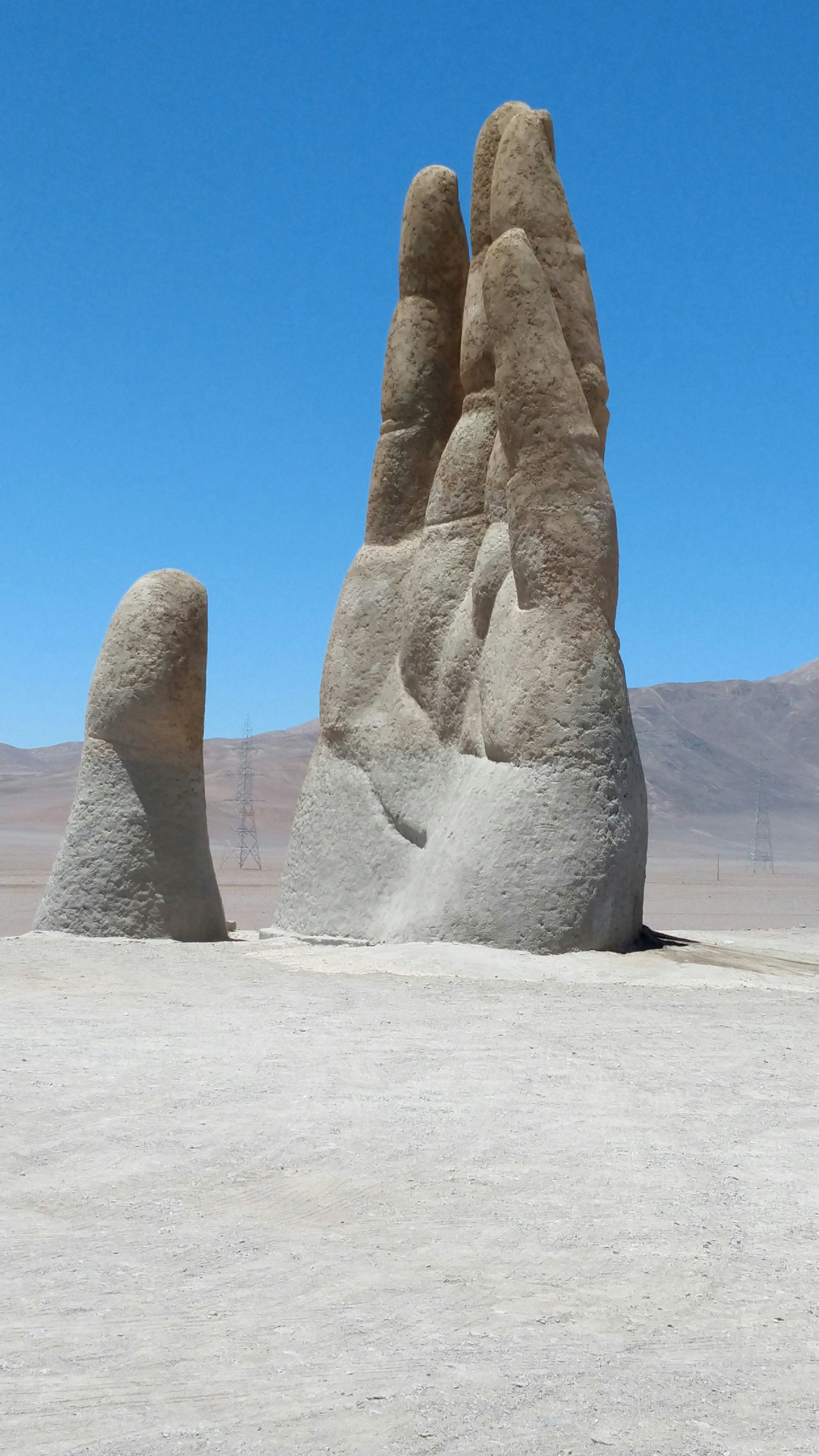 Grey hand statue photo – Free Blue Image on Unsplash
