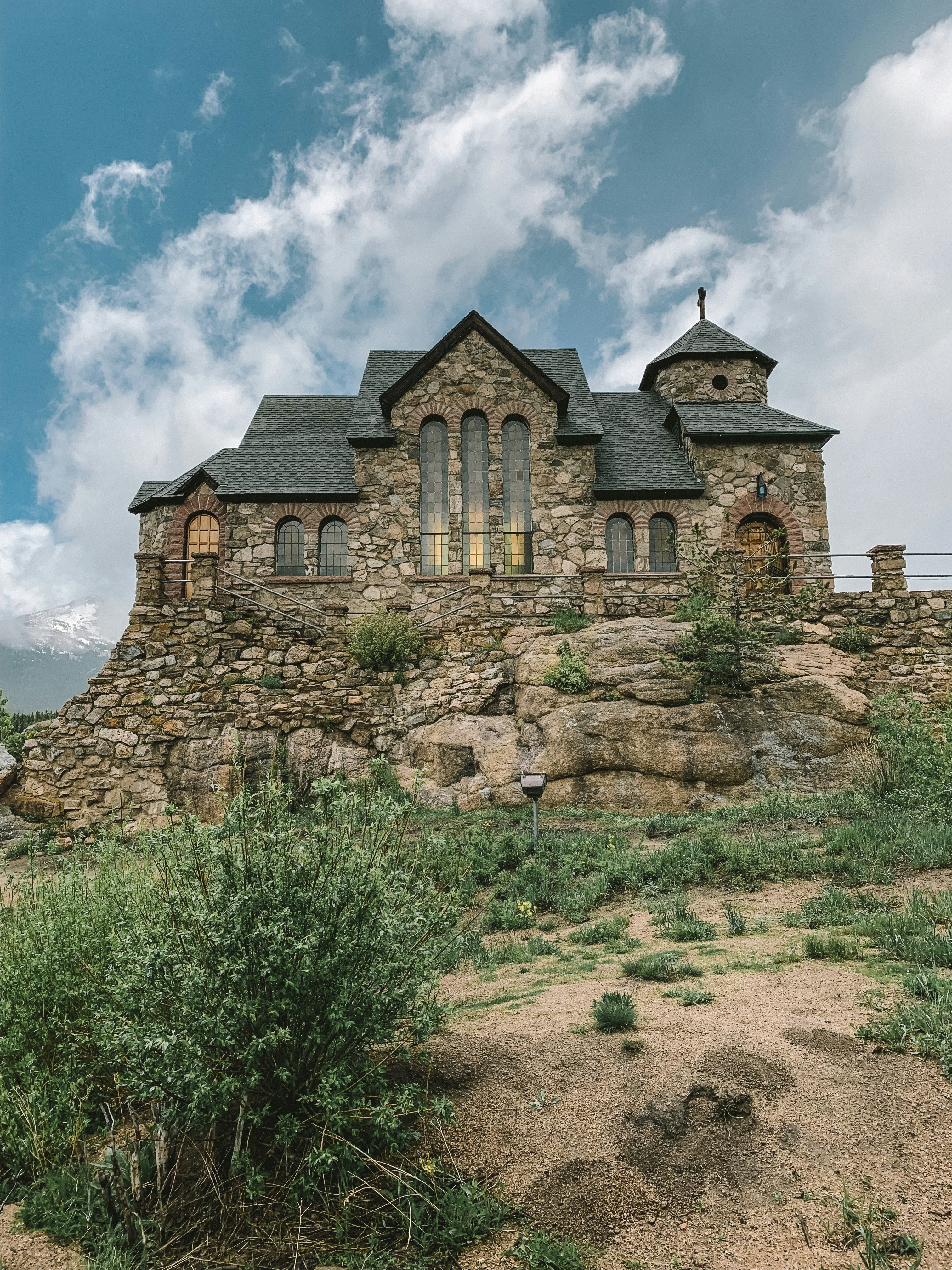 Stone Sanctuary on a Cliff: Alpine Church with Turret