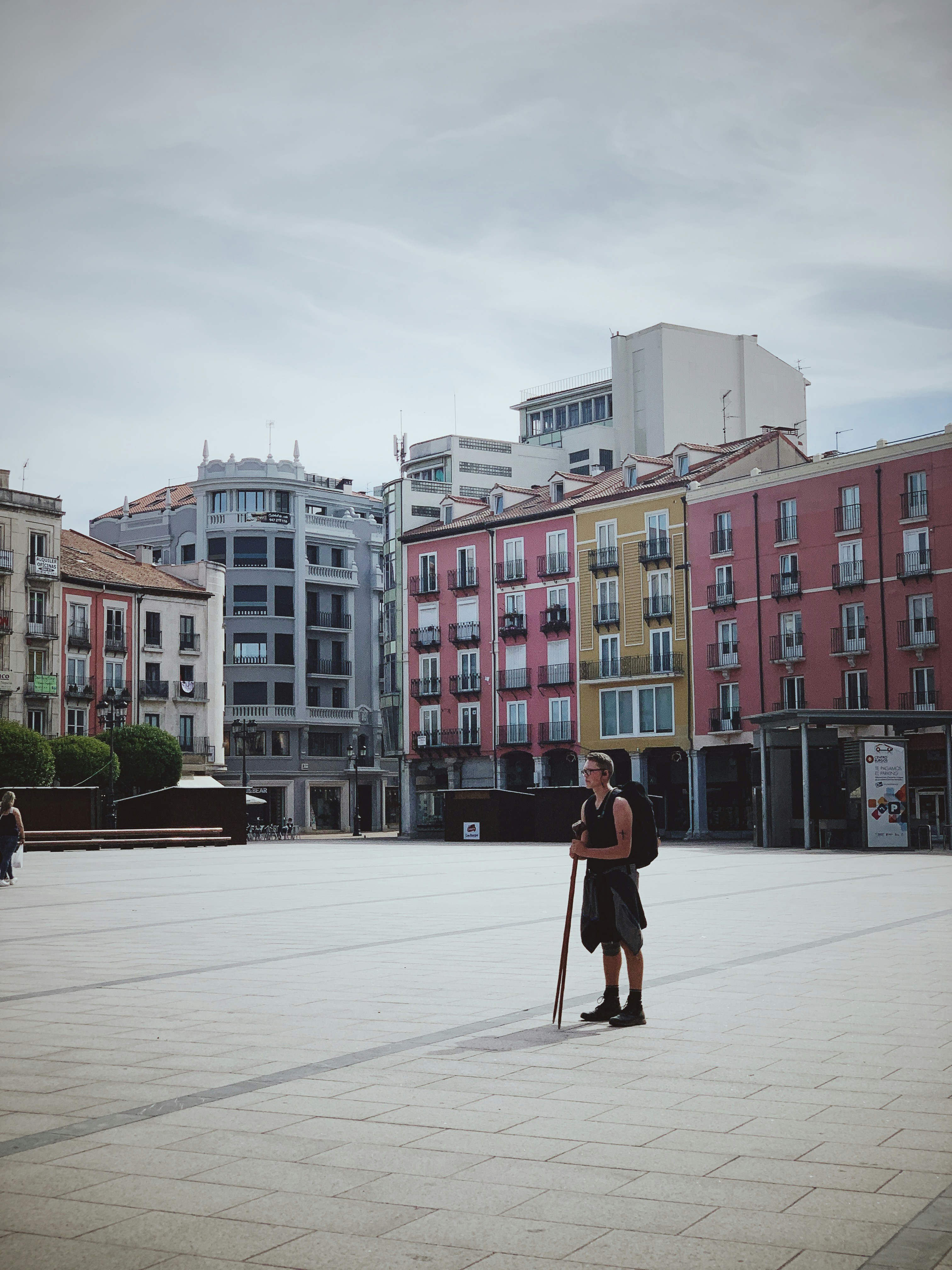 Man standing near building photo – Free Grey Image on Unsplash