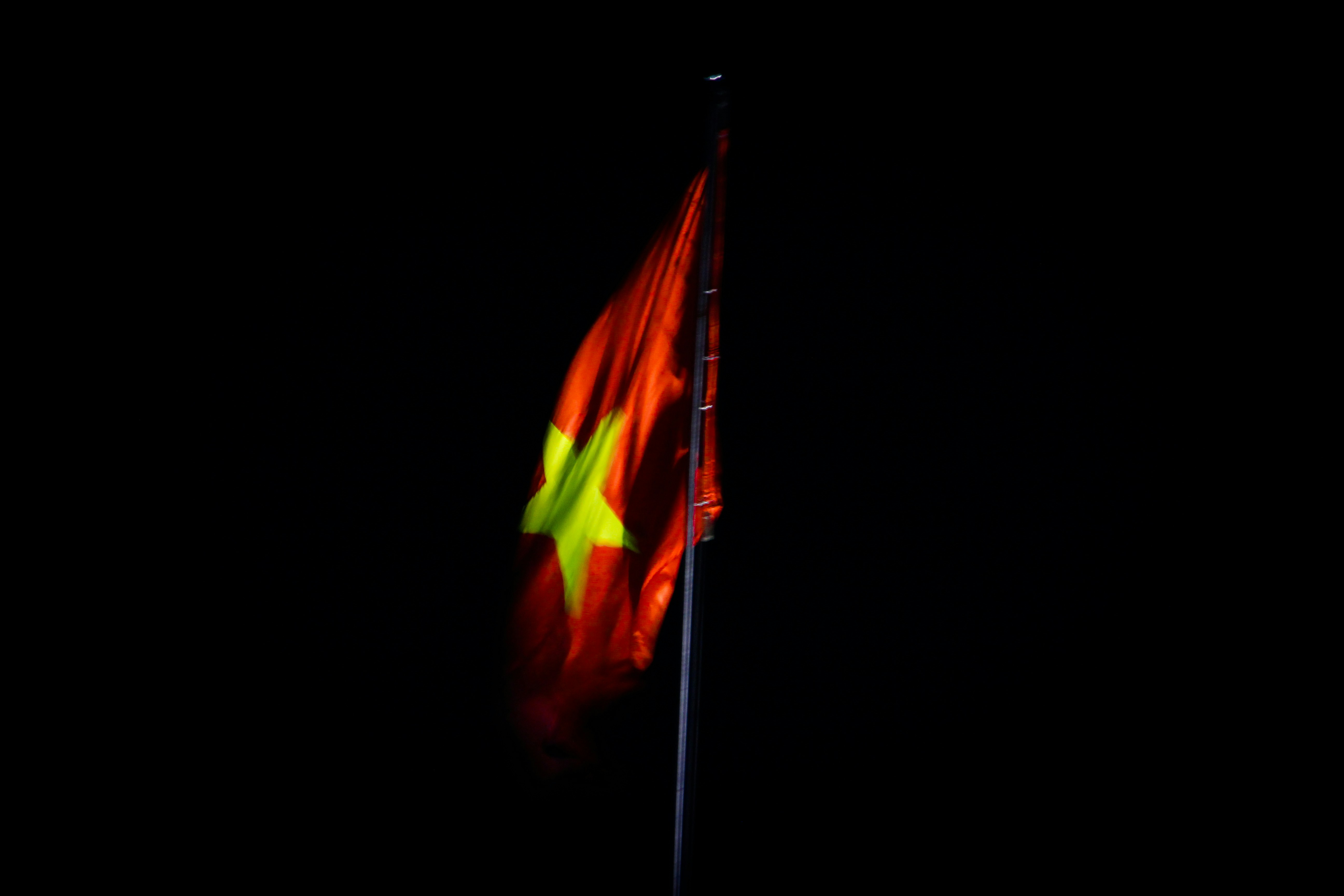 Lone Star on a Red Veil: Vietnam Flag in Nightfall