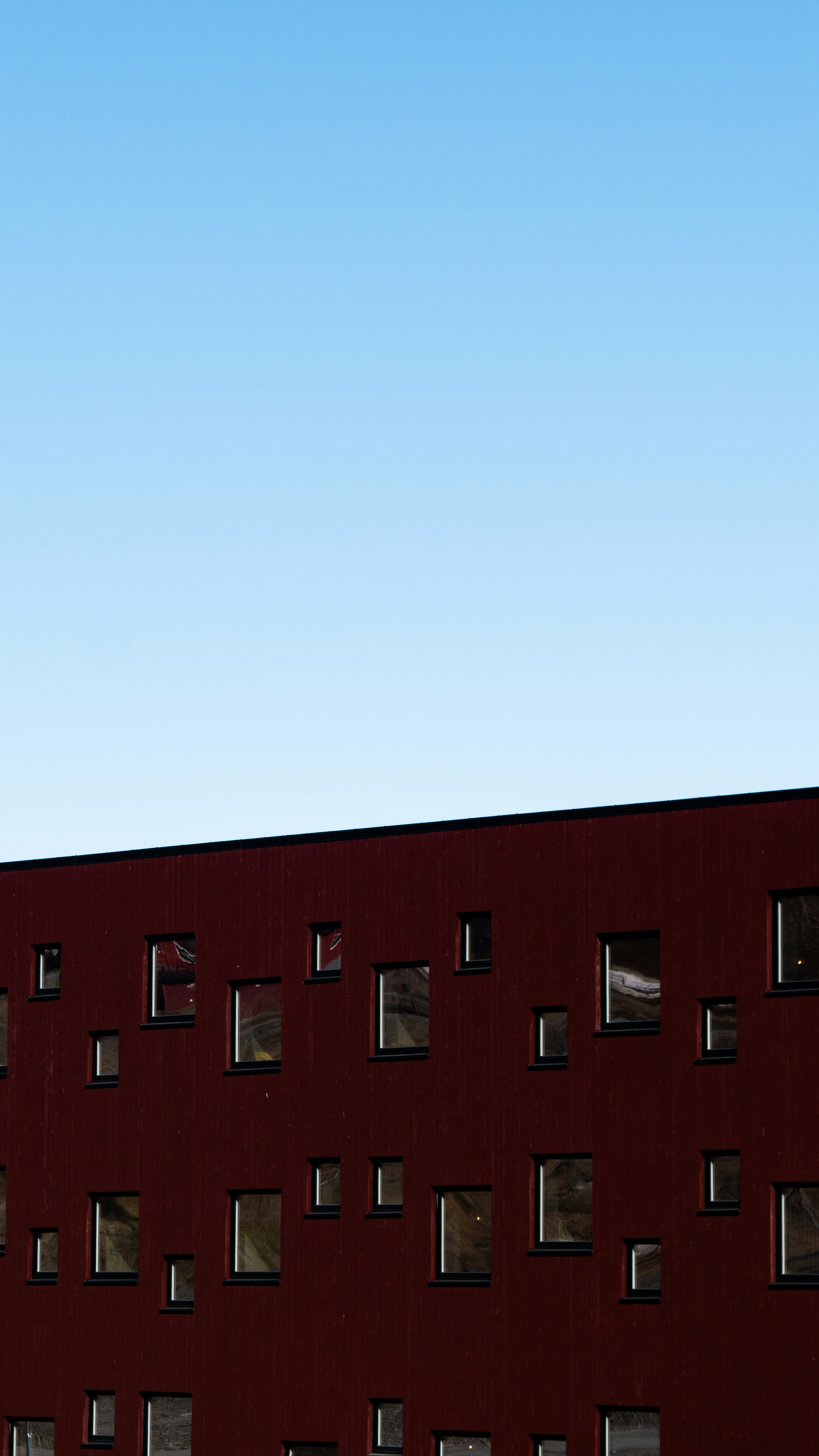 Red concrete building photo – Free Minimalistic Image on Unsplash