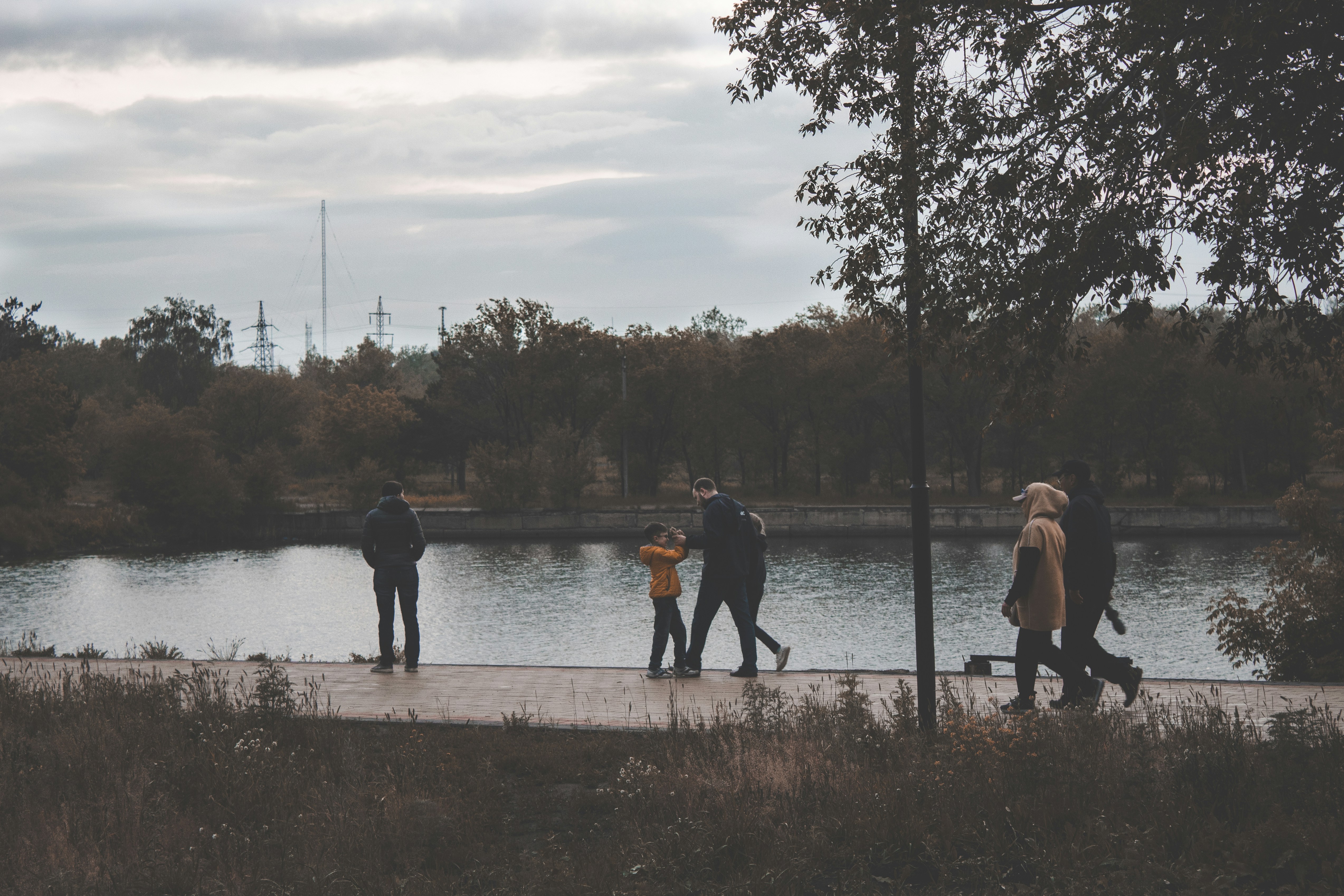 Orange Beacon on a Quiet Lakeside Boardwalk