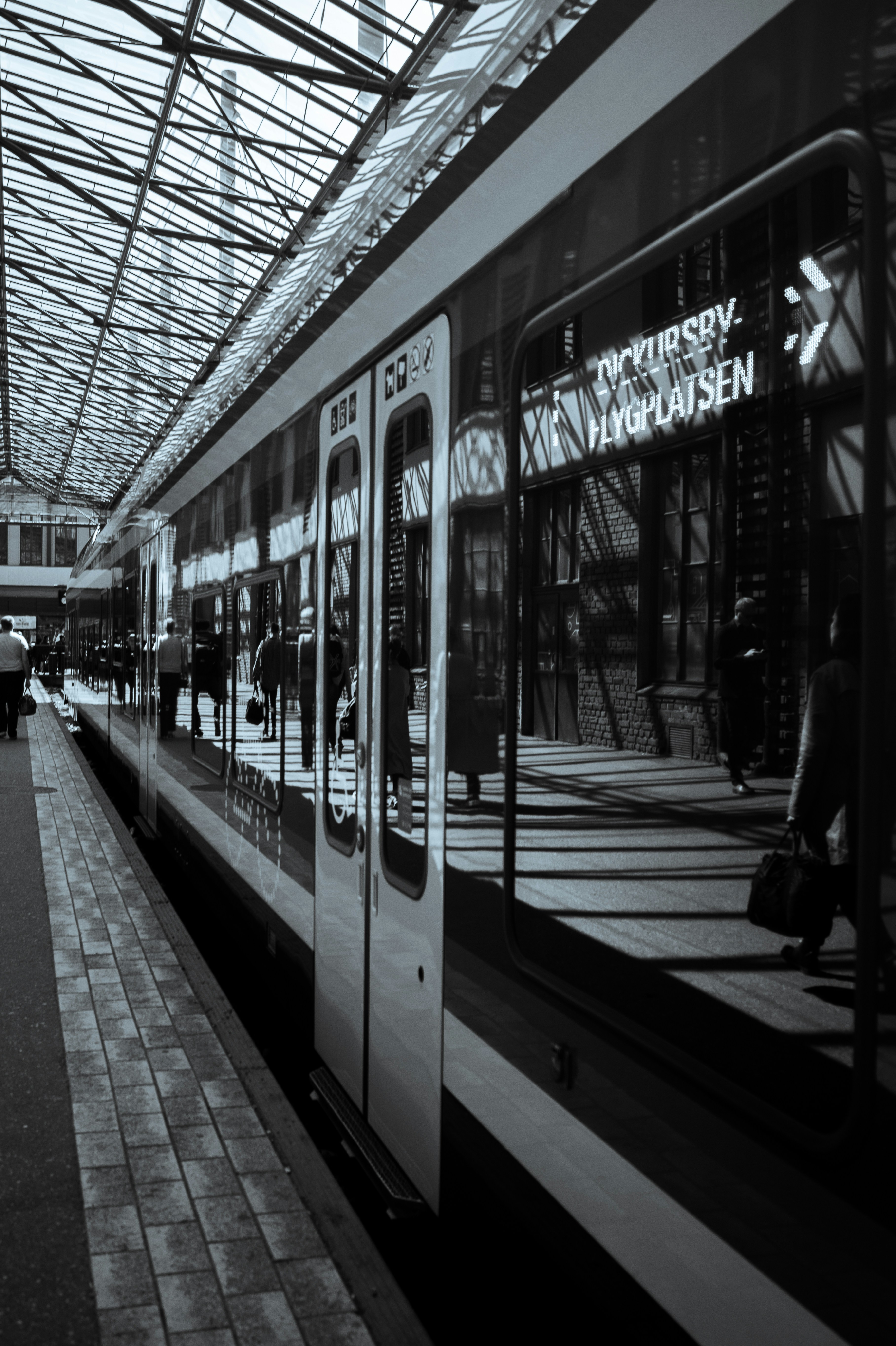 Grayscale photo of train photo – Free Building Image on Unsplash
