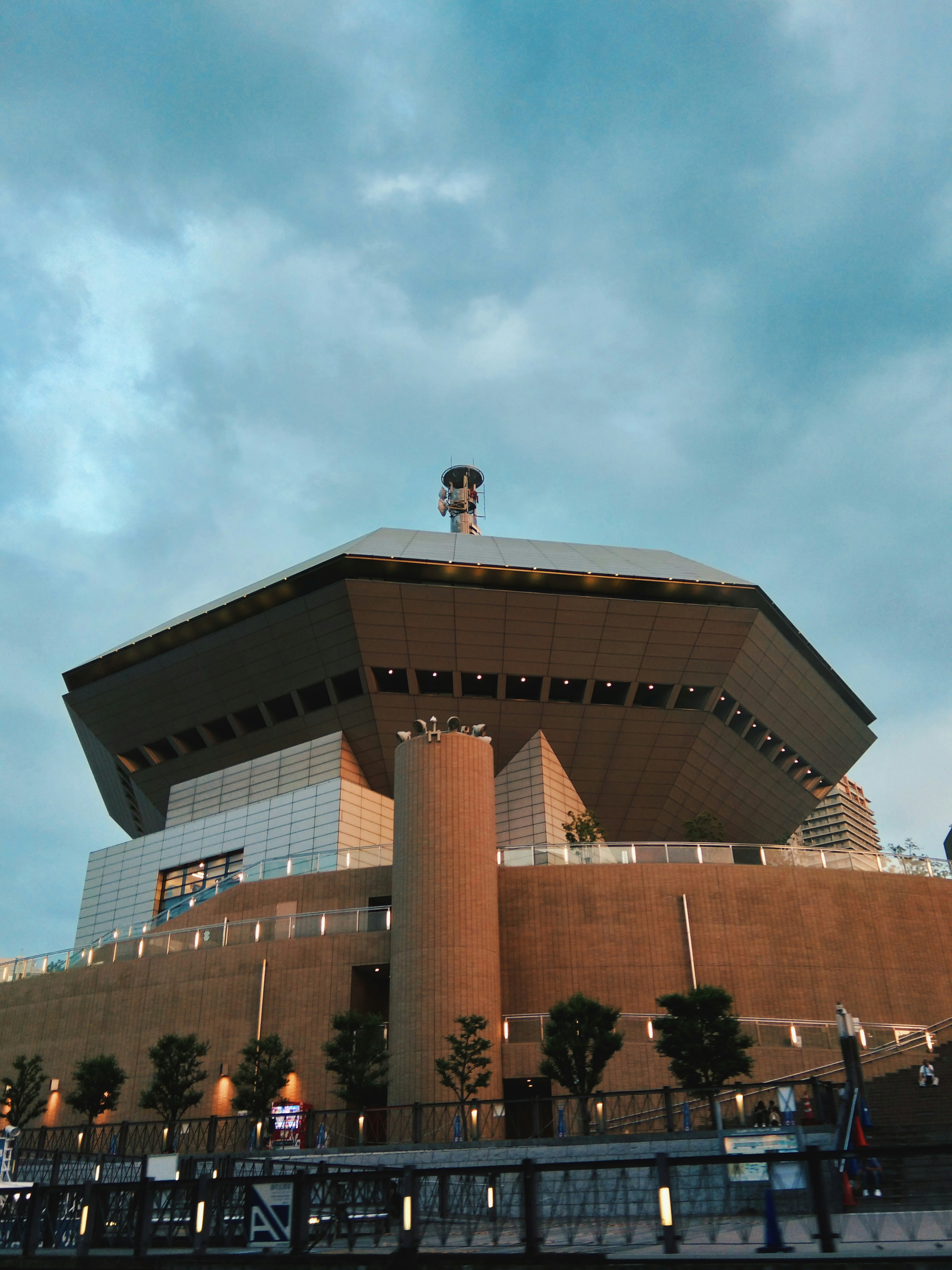 Hex Roof Horizon: A Civic Tower with a Bold, Overhanging Crown