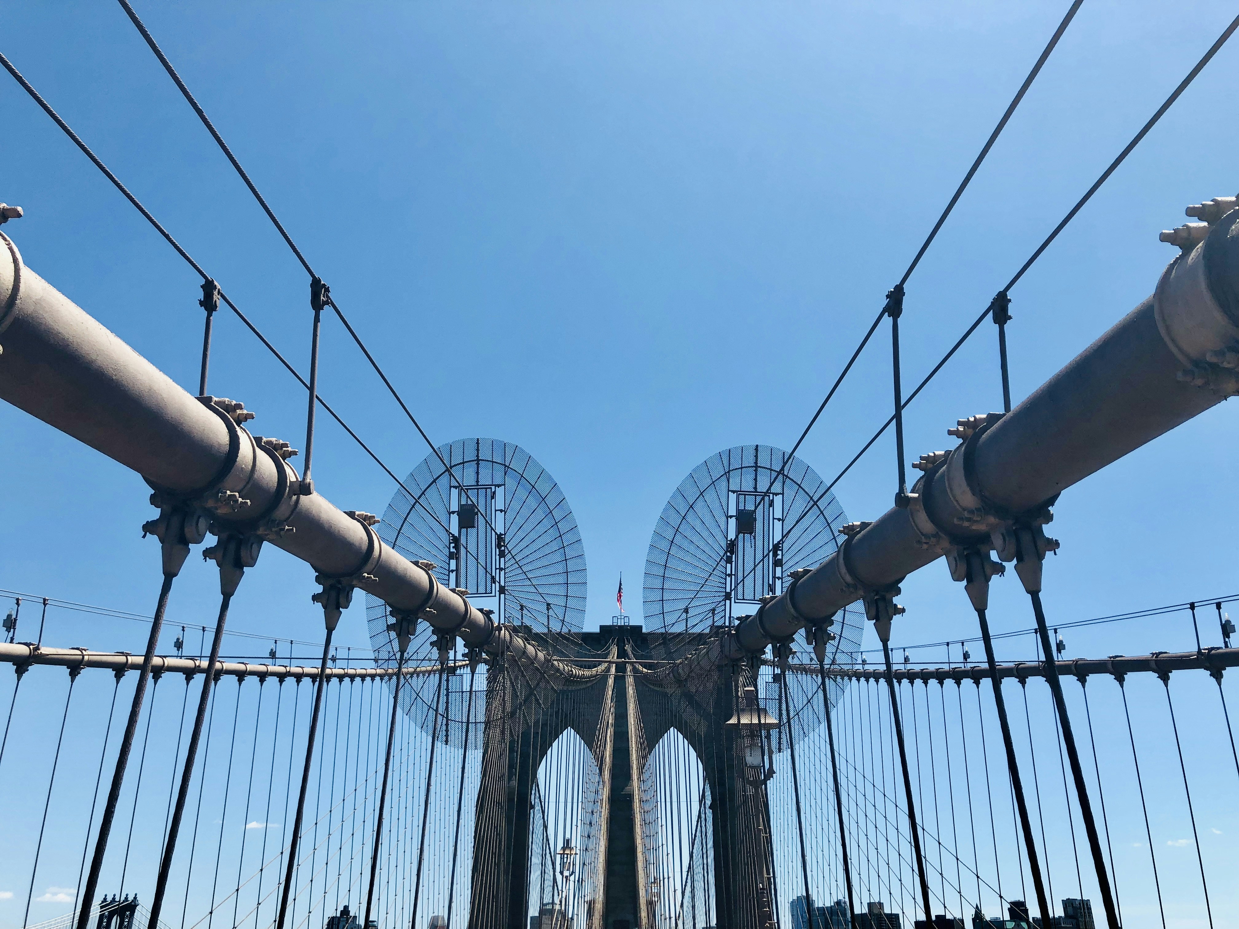 a view of a bridge from the ground
