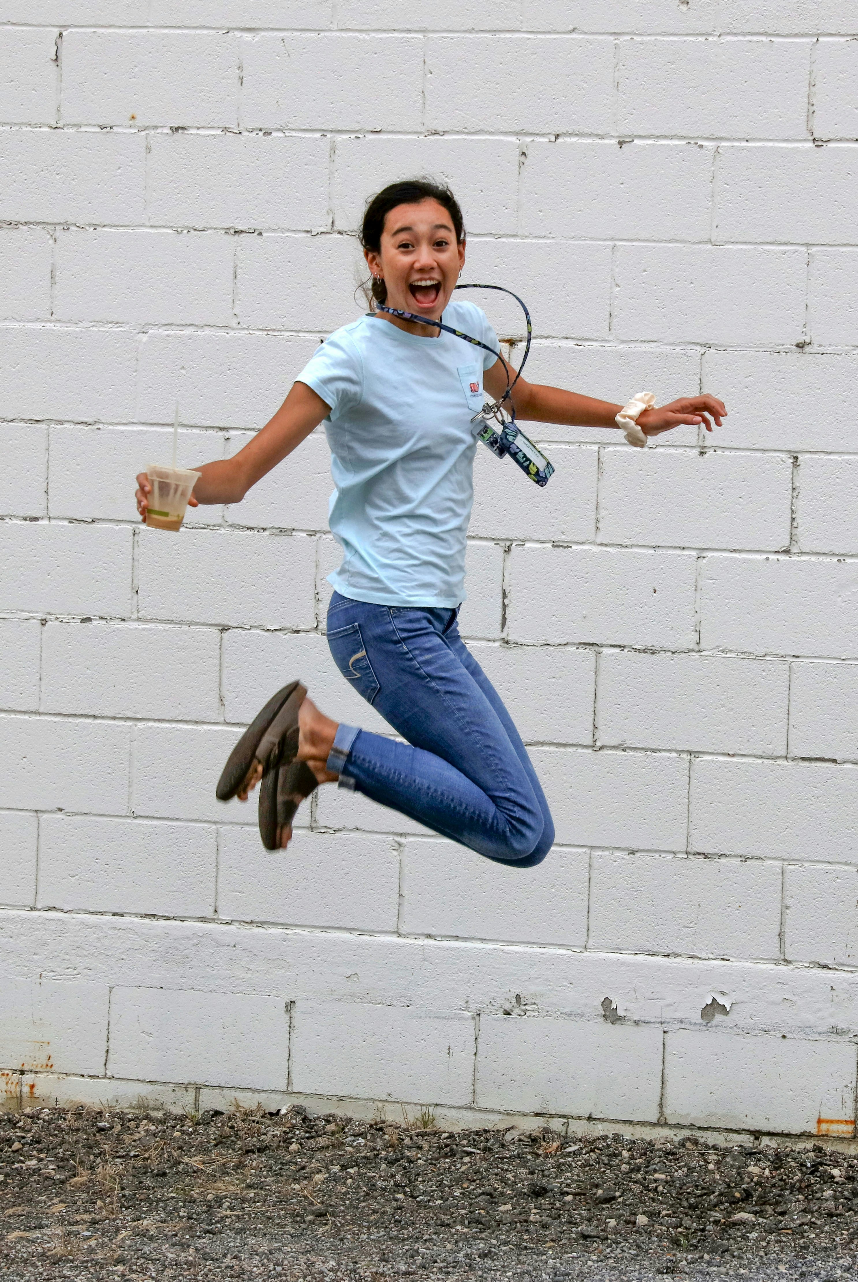 Jump shot photo of woman while smiling photo – Free Human Image on Unsplash