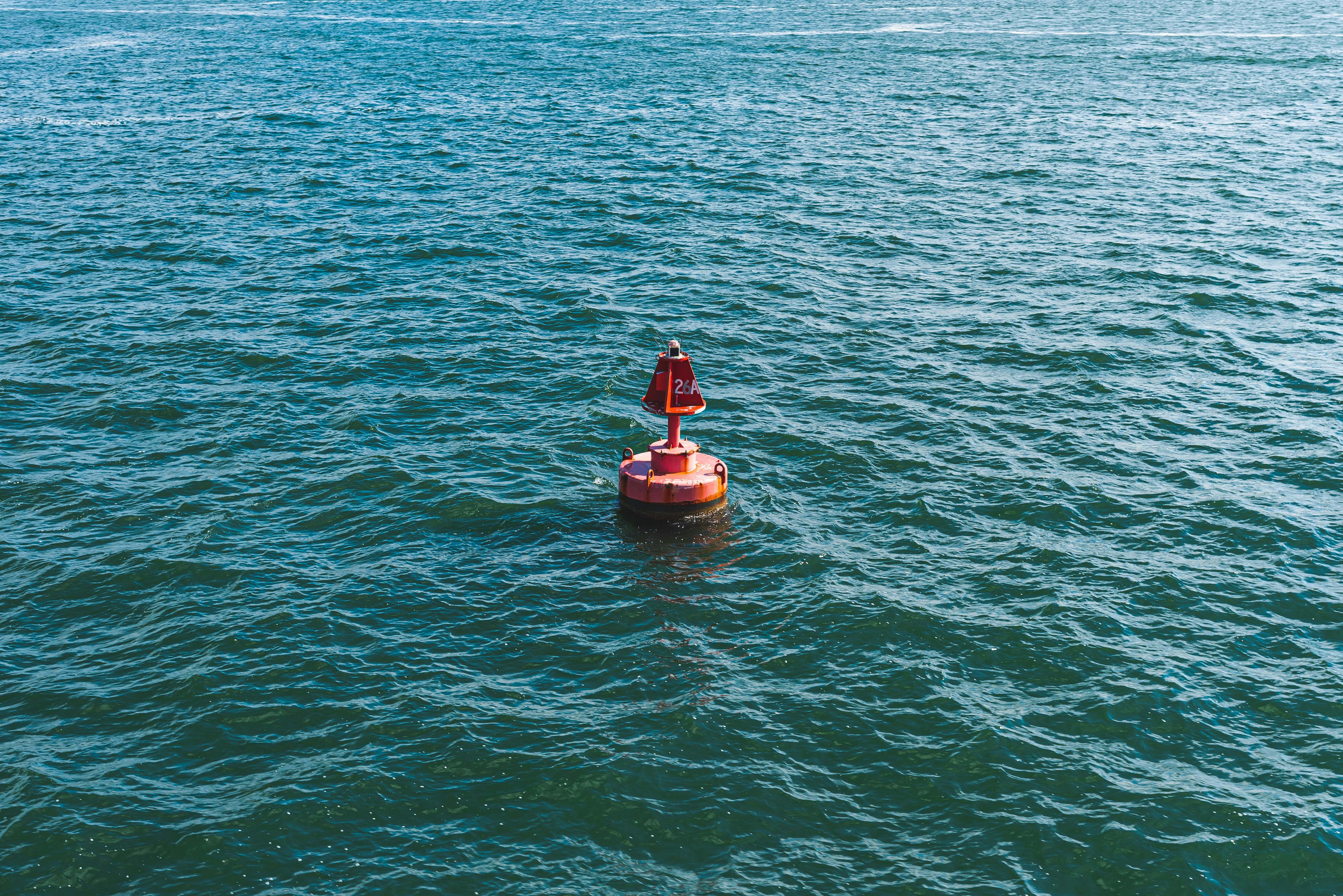 Shot while on a San Diego Bay cruise | round red metal equipment