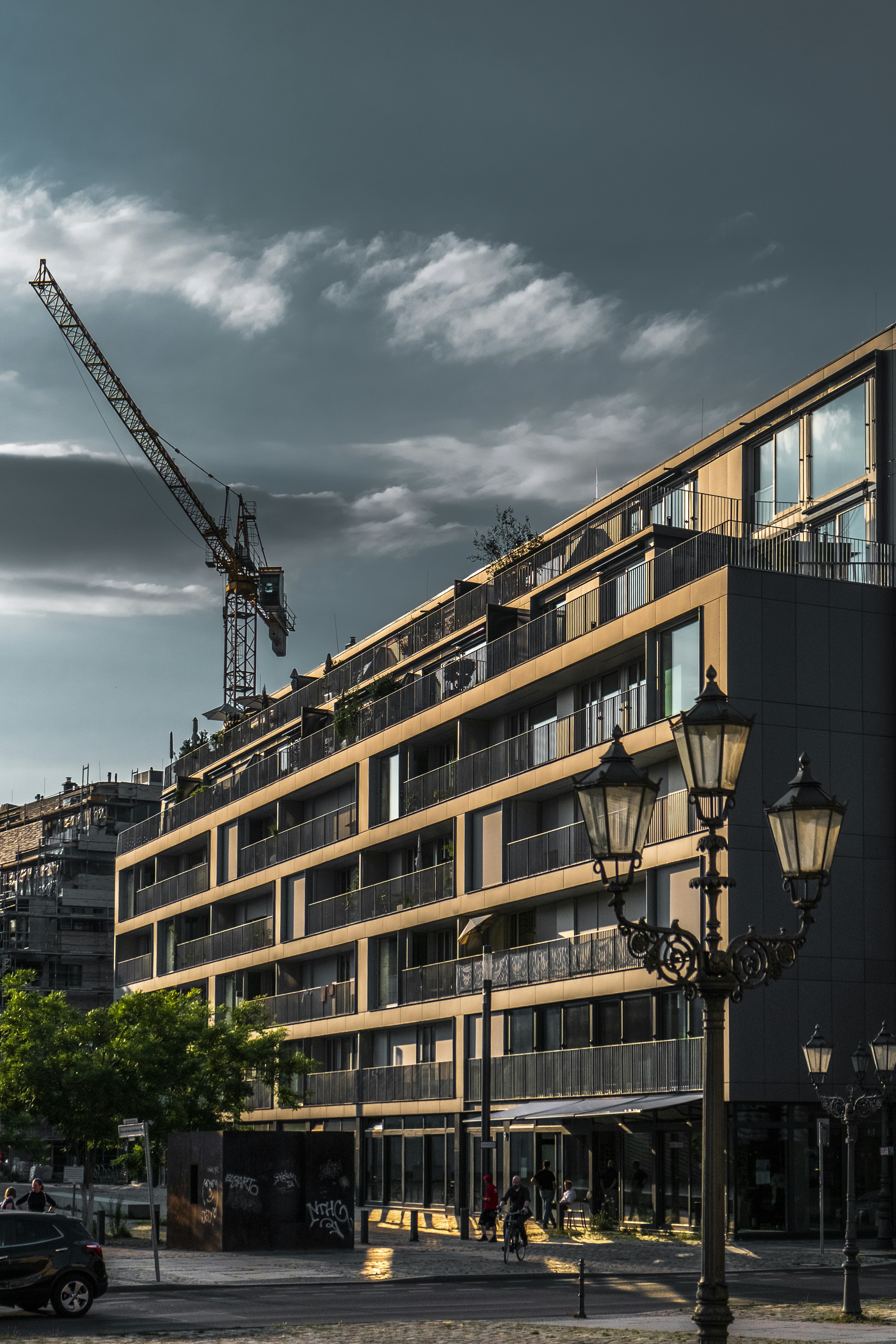 Brown mid-rise building under gray sky photo – Free Building Image on ...