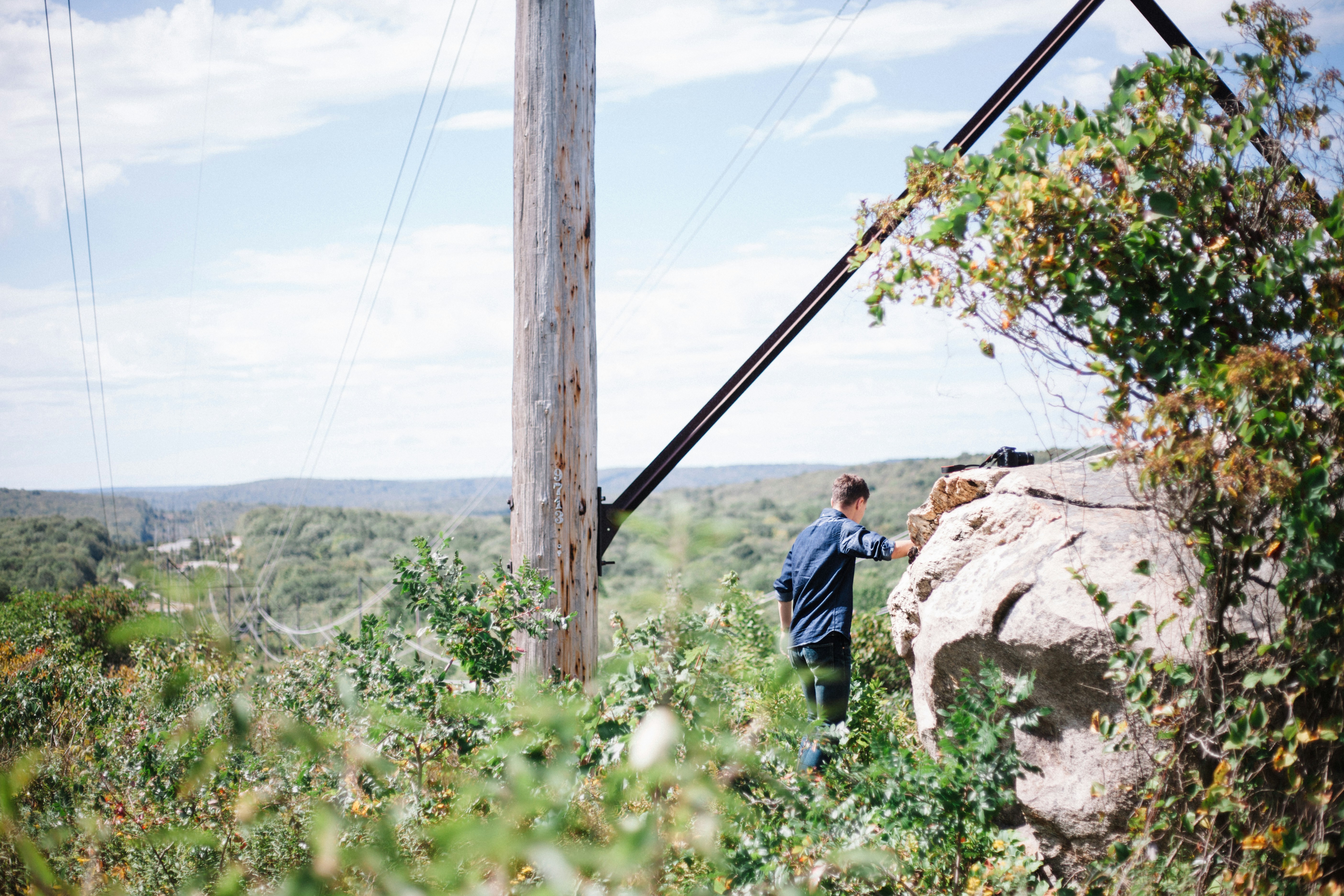 Ridge Walk Under Power Lines: A Quiet Portrait on the Hill