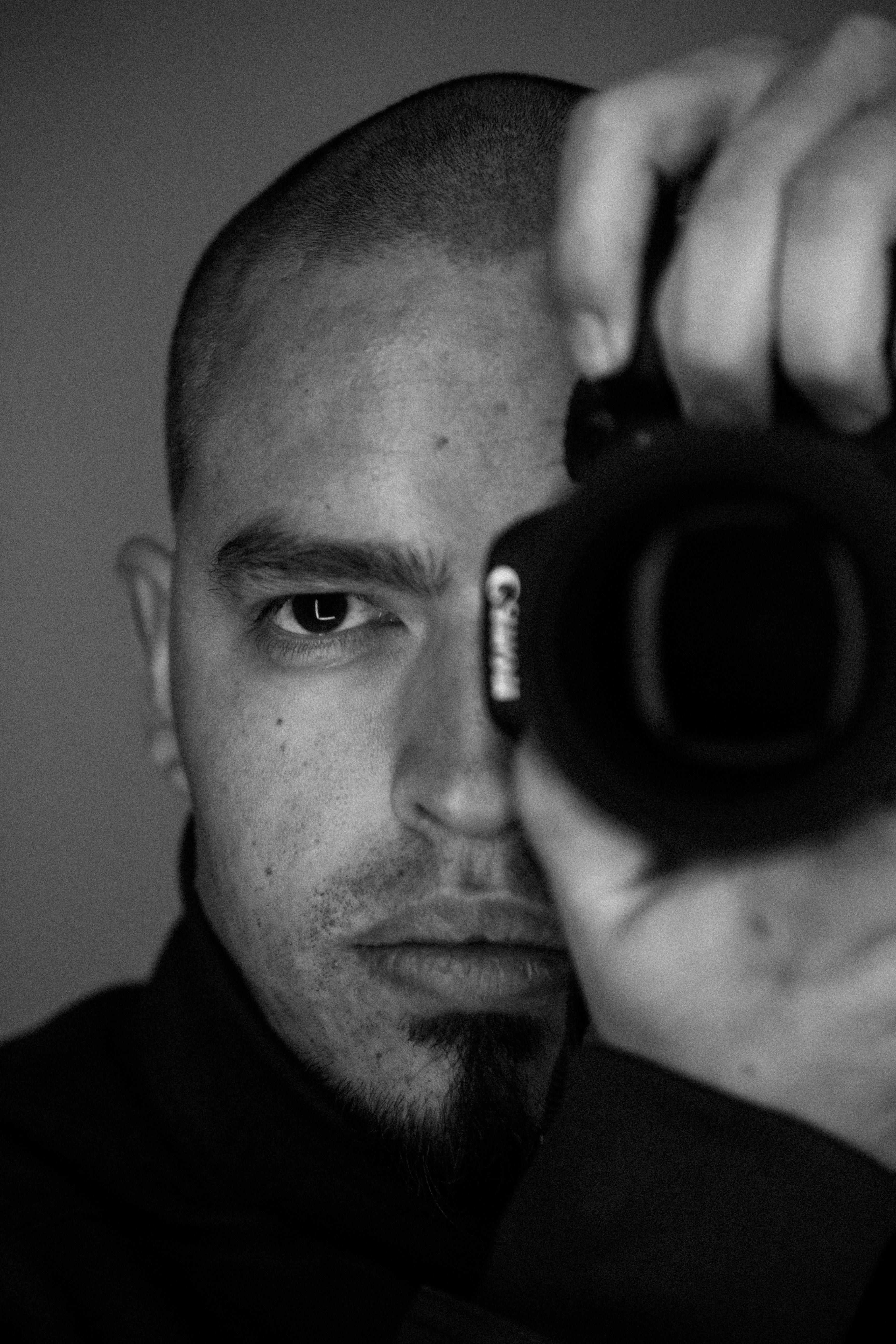 Grayscale photography of man holding Canon camera photo – Free Human ...