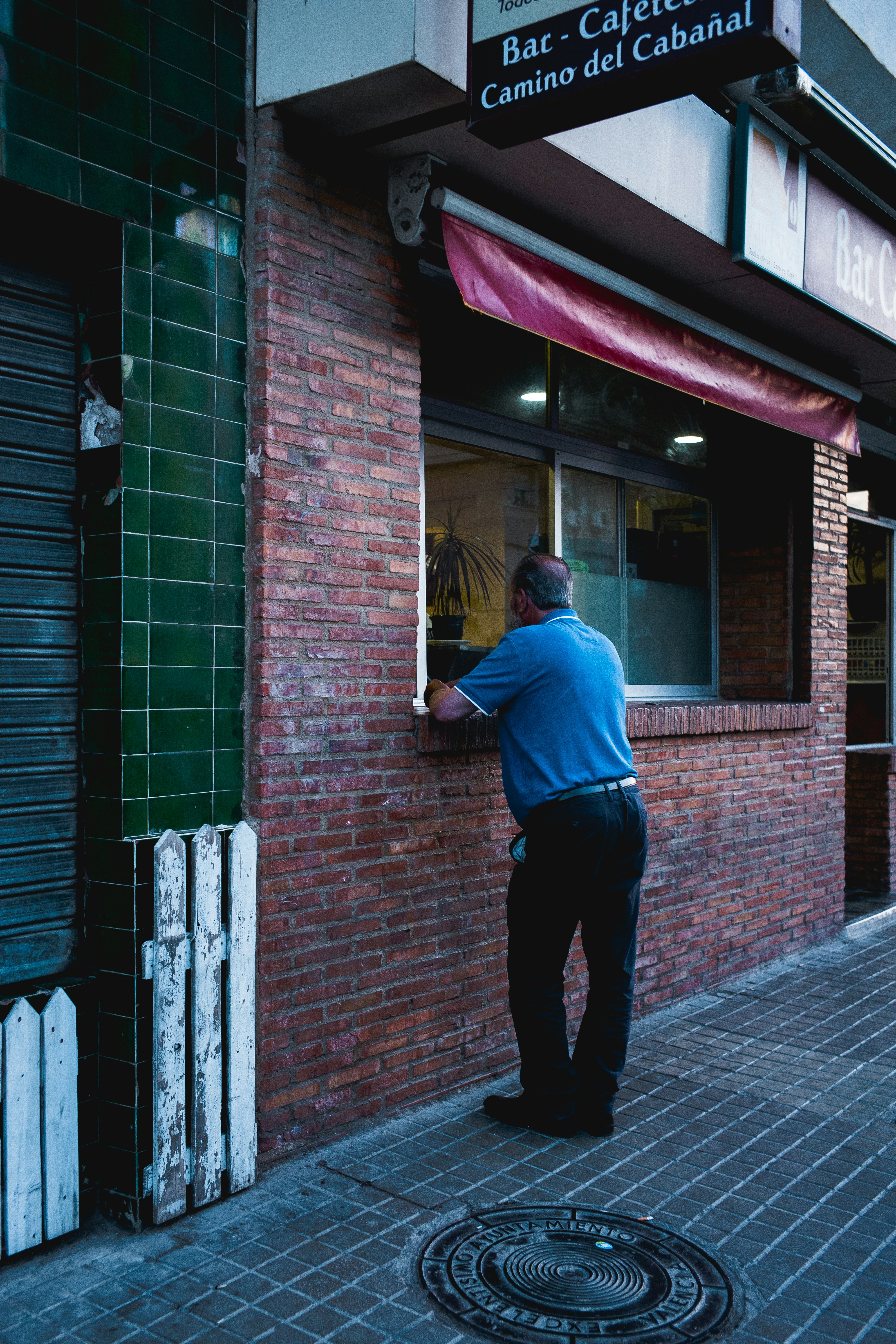 Man standing beside building during daytime photo – Free Human Image on ...