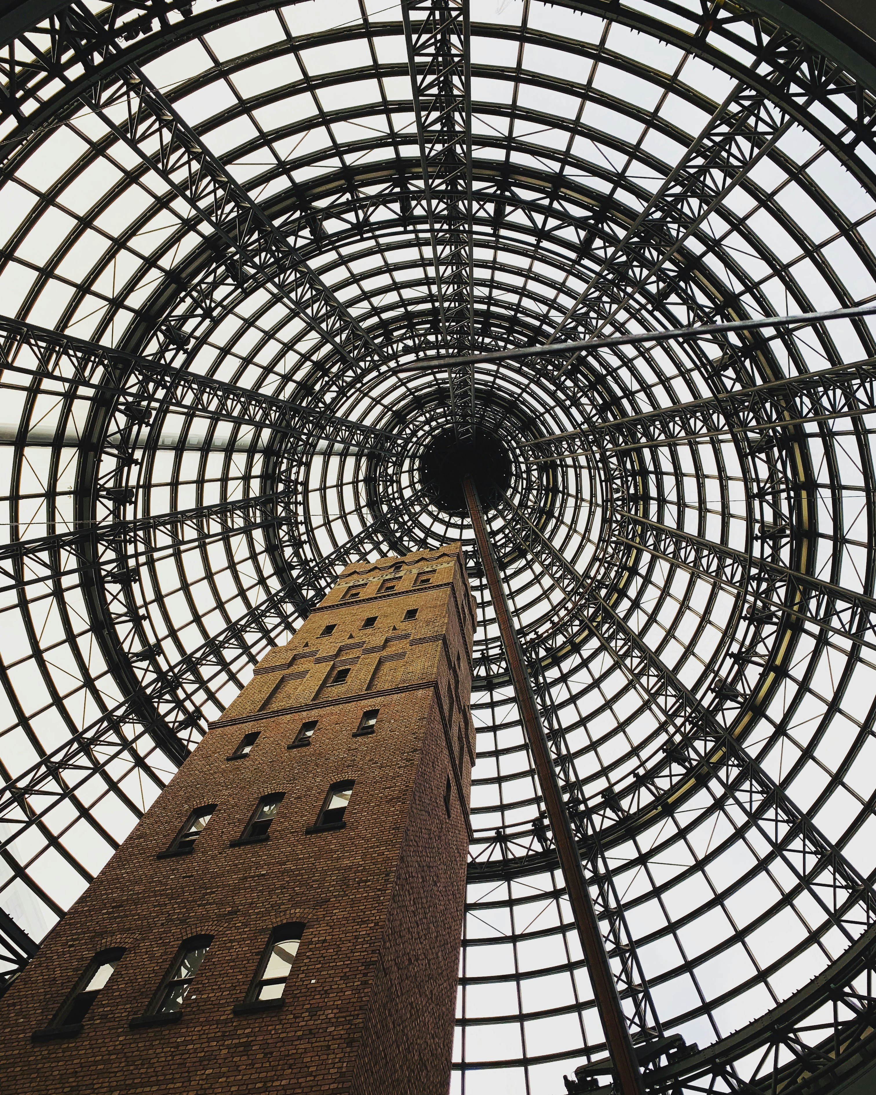 Spoked Glass Dome Convergence: A Brick Tower Reaches the Sky