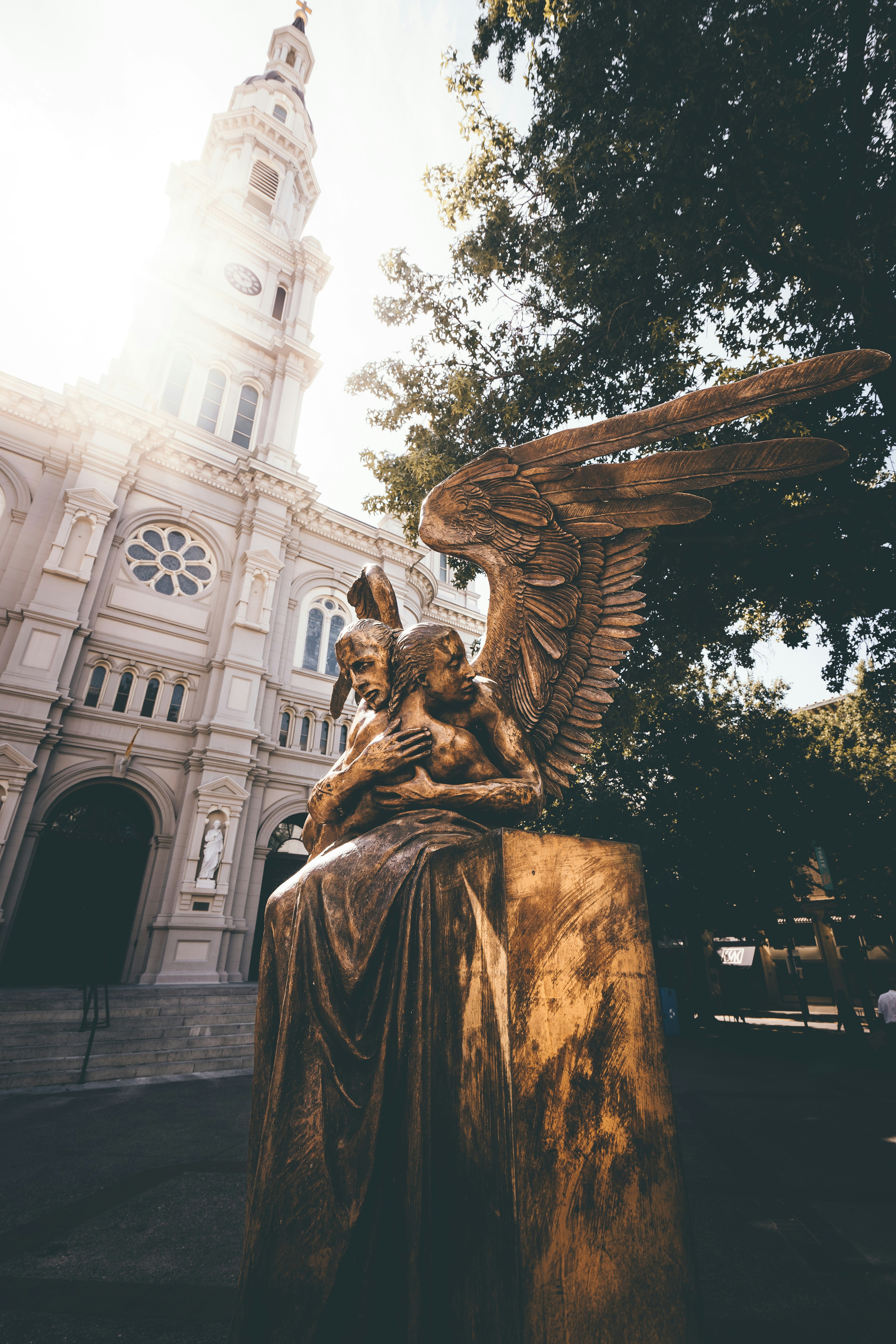 Angel hugging woman statue photo – Free Monument Image on Unsplash