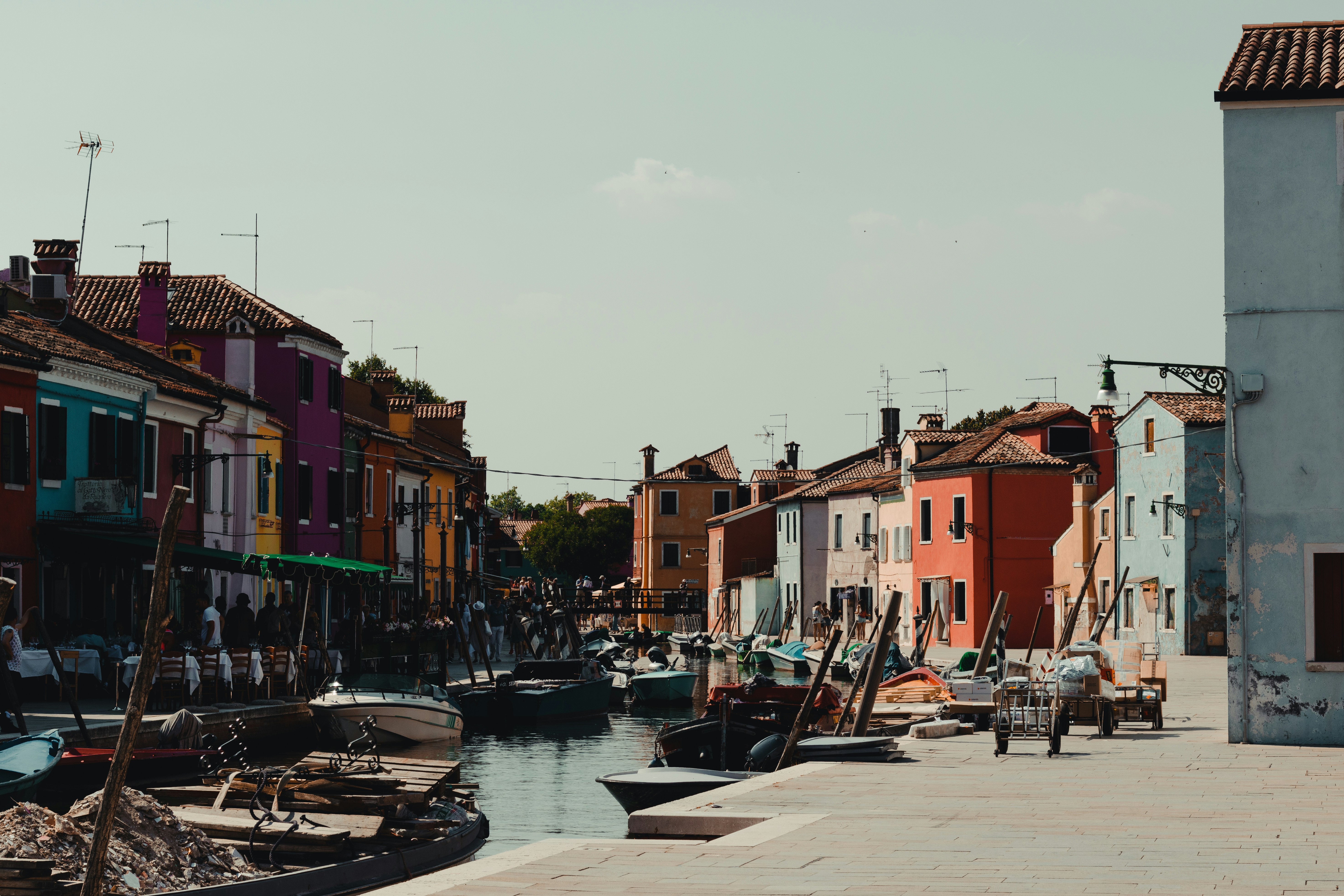 boats parked between buildingsLudovico Lovisetto
