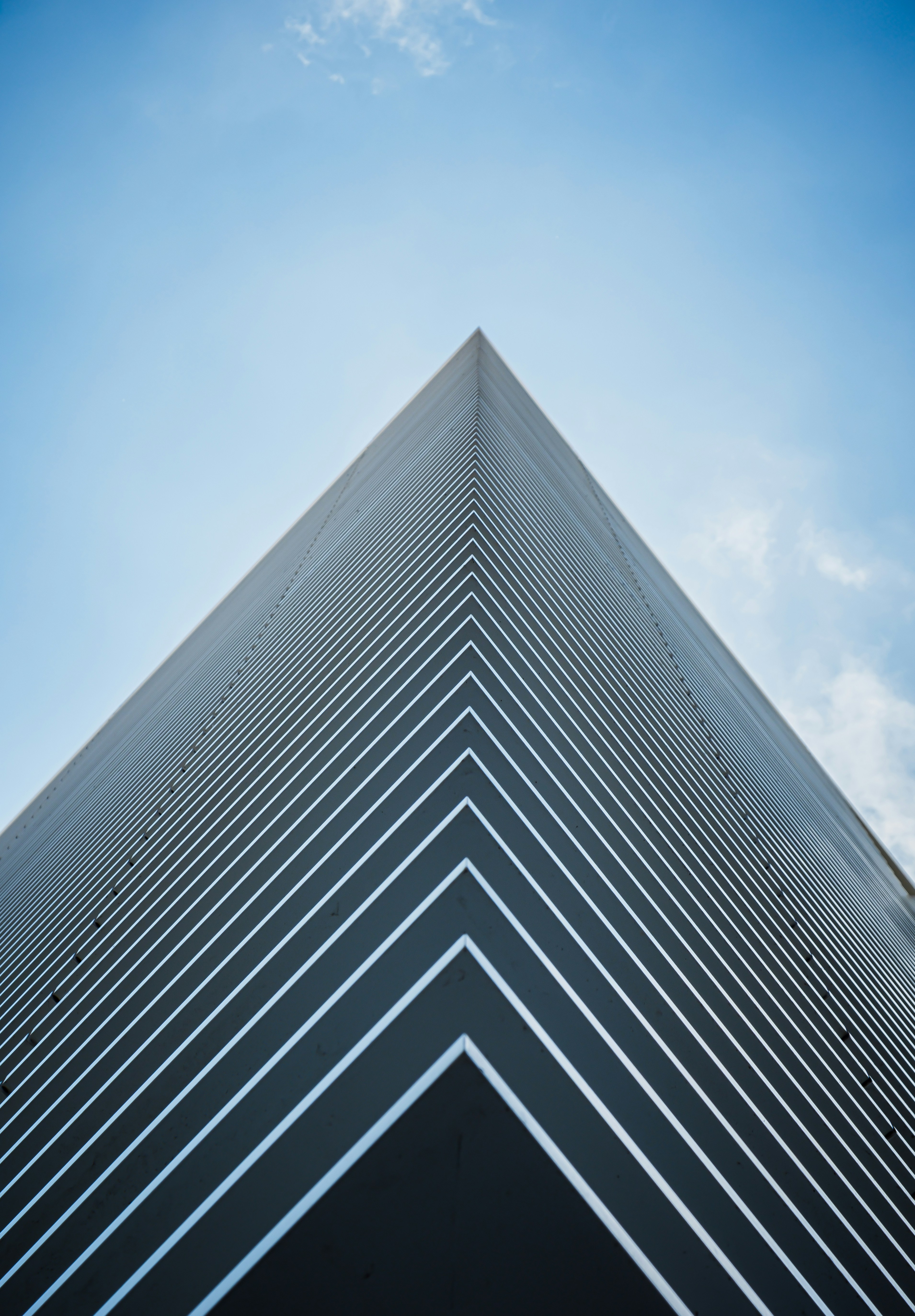 Worm's eye view of a black and gray building photo – Free Architecture ...