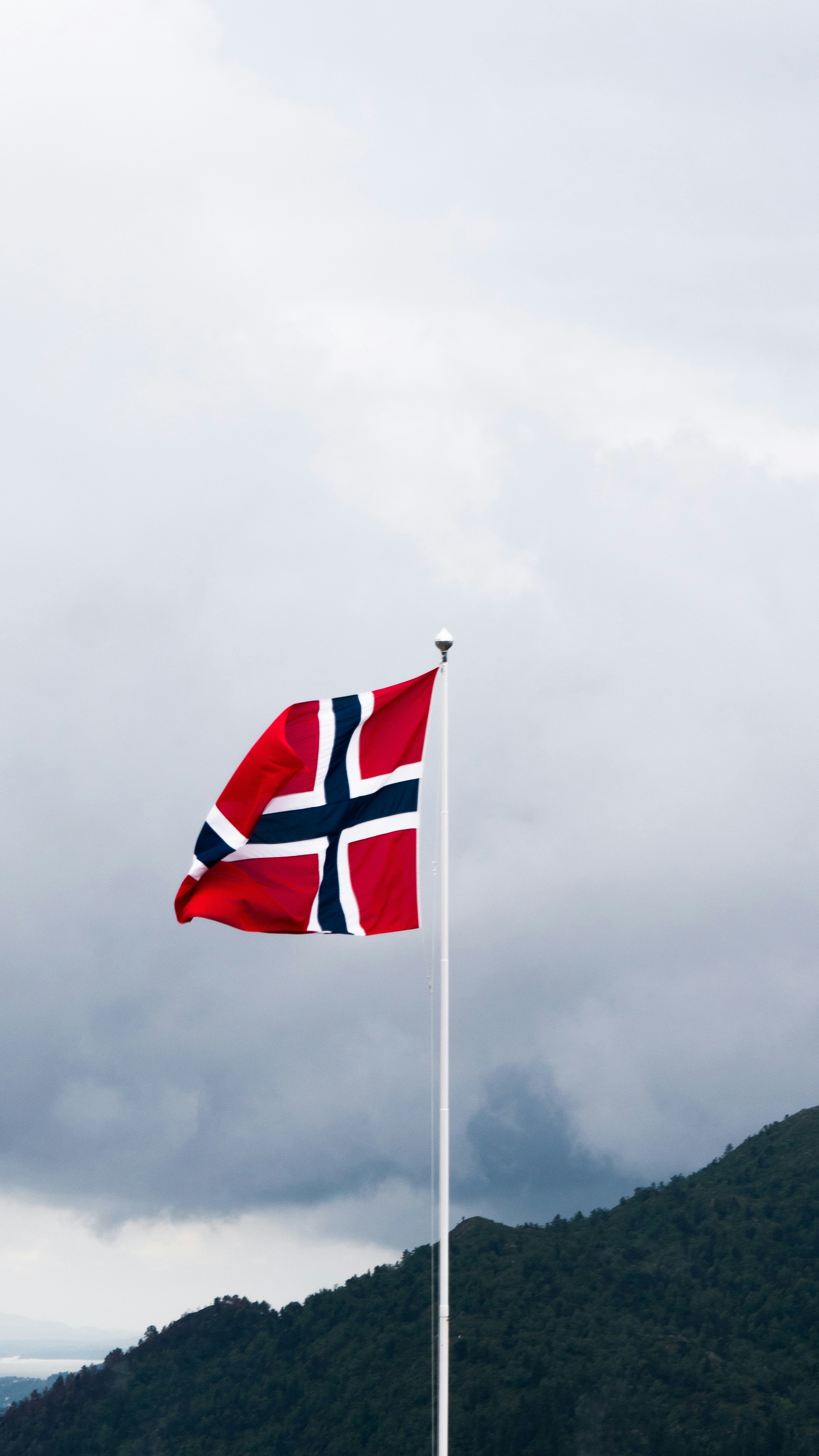 Norway flag on top of pole during day