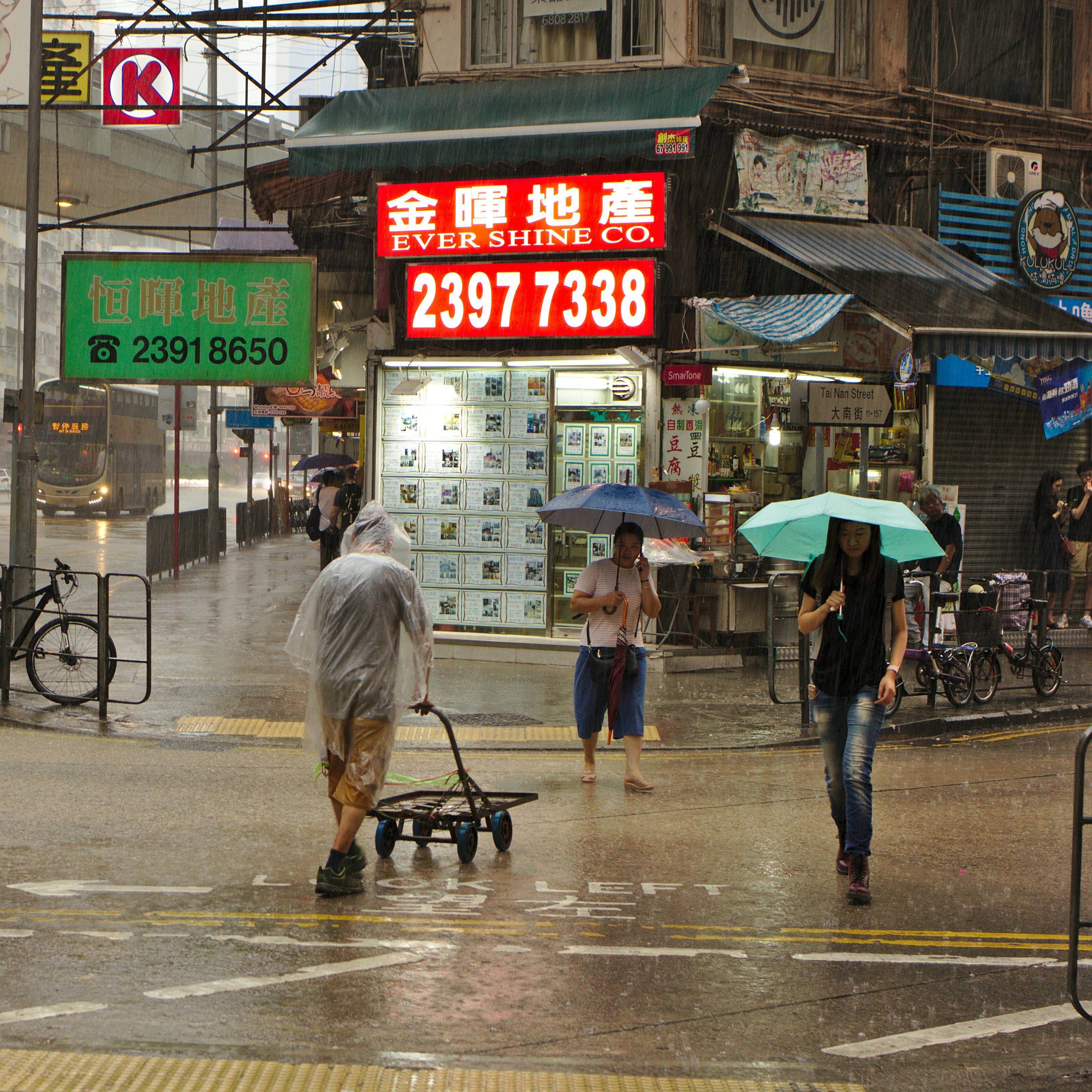 Rainy Street in Neon Glow