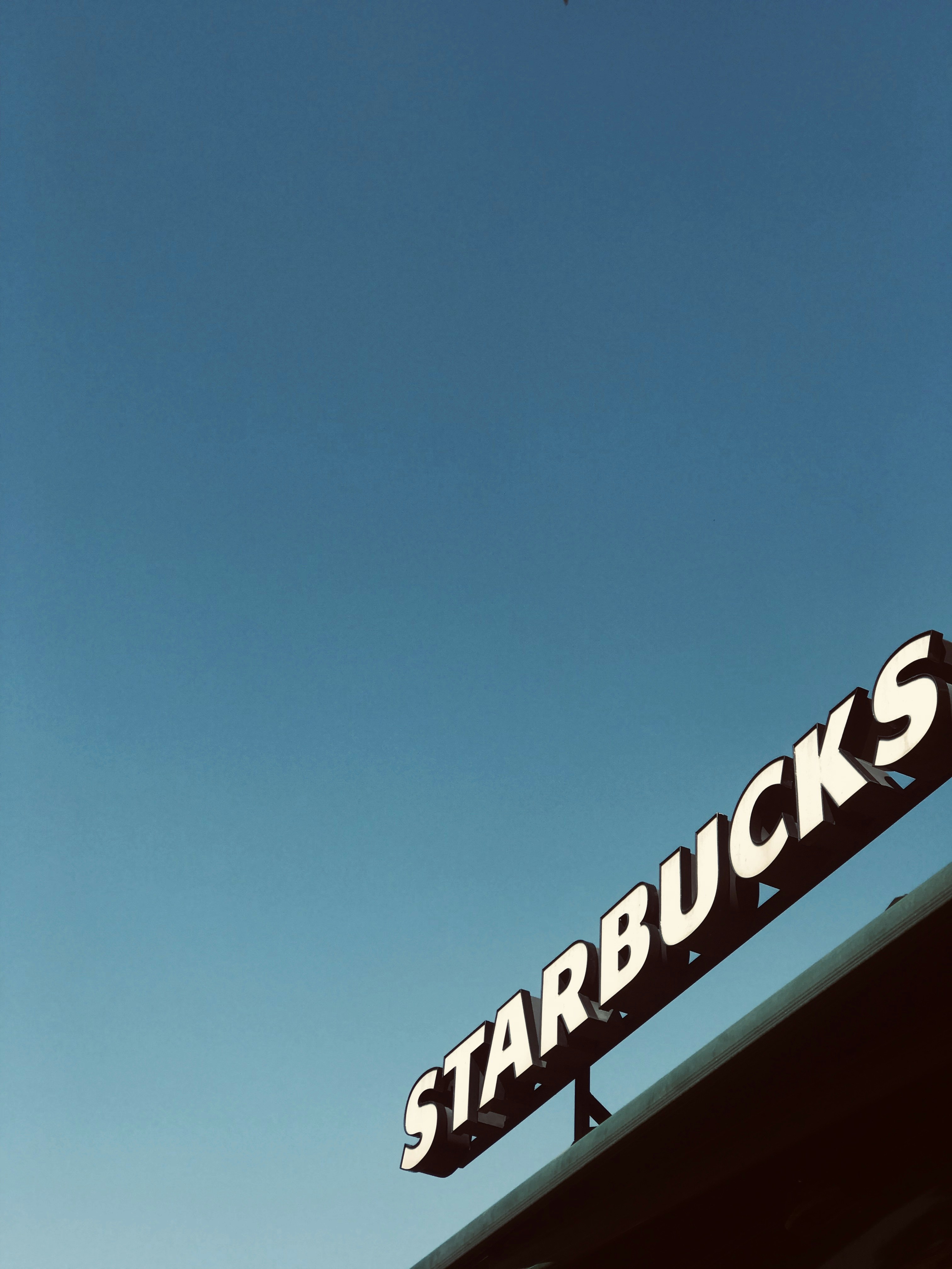 Starbucks board sign close-up photography