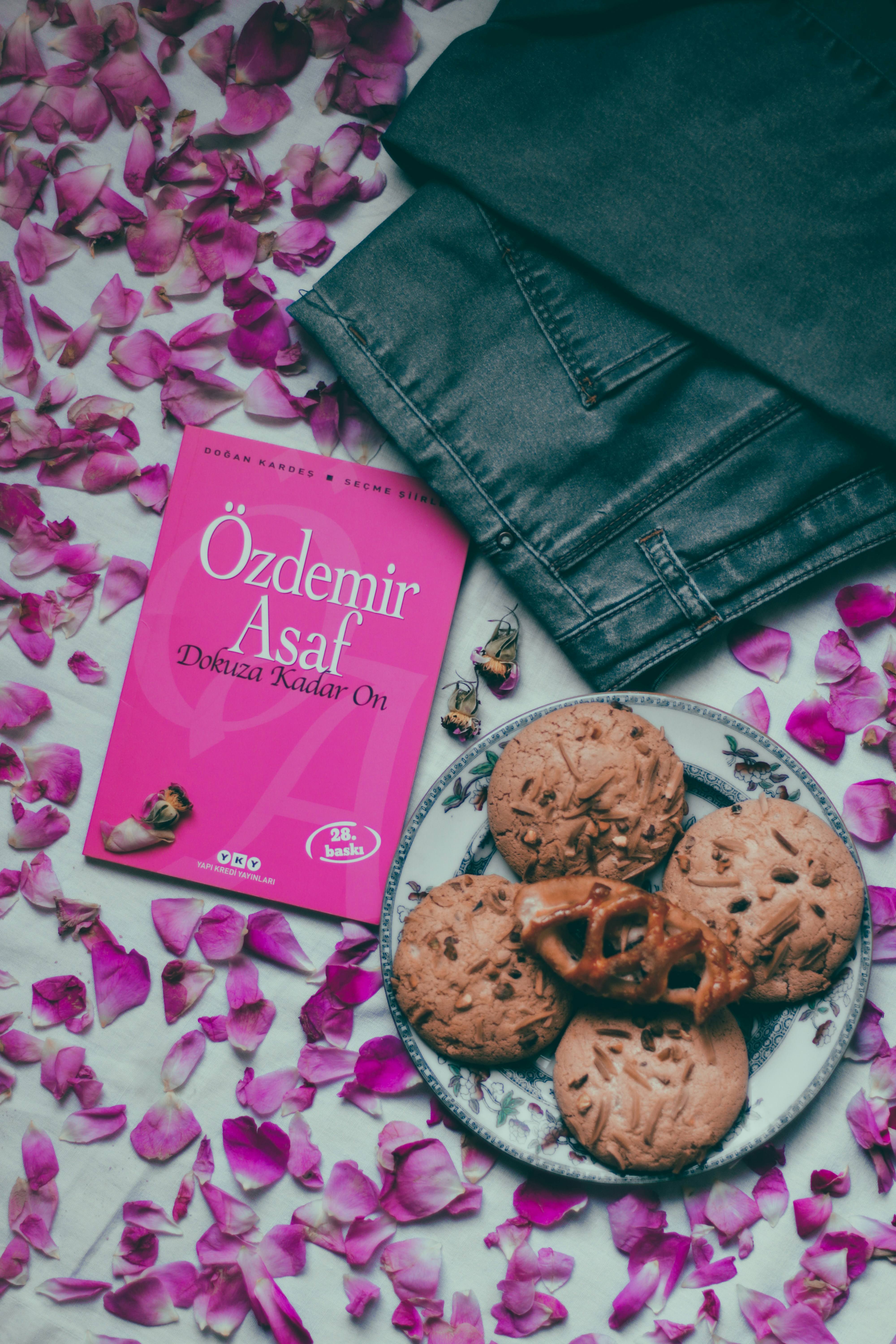 Petals, Cookies, and Poetry: A Cozy Özdemir Asaf Flat-Lay
