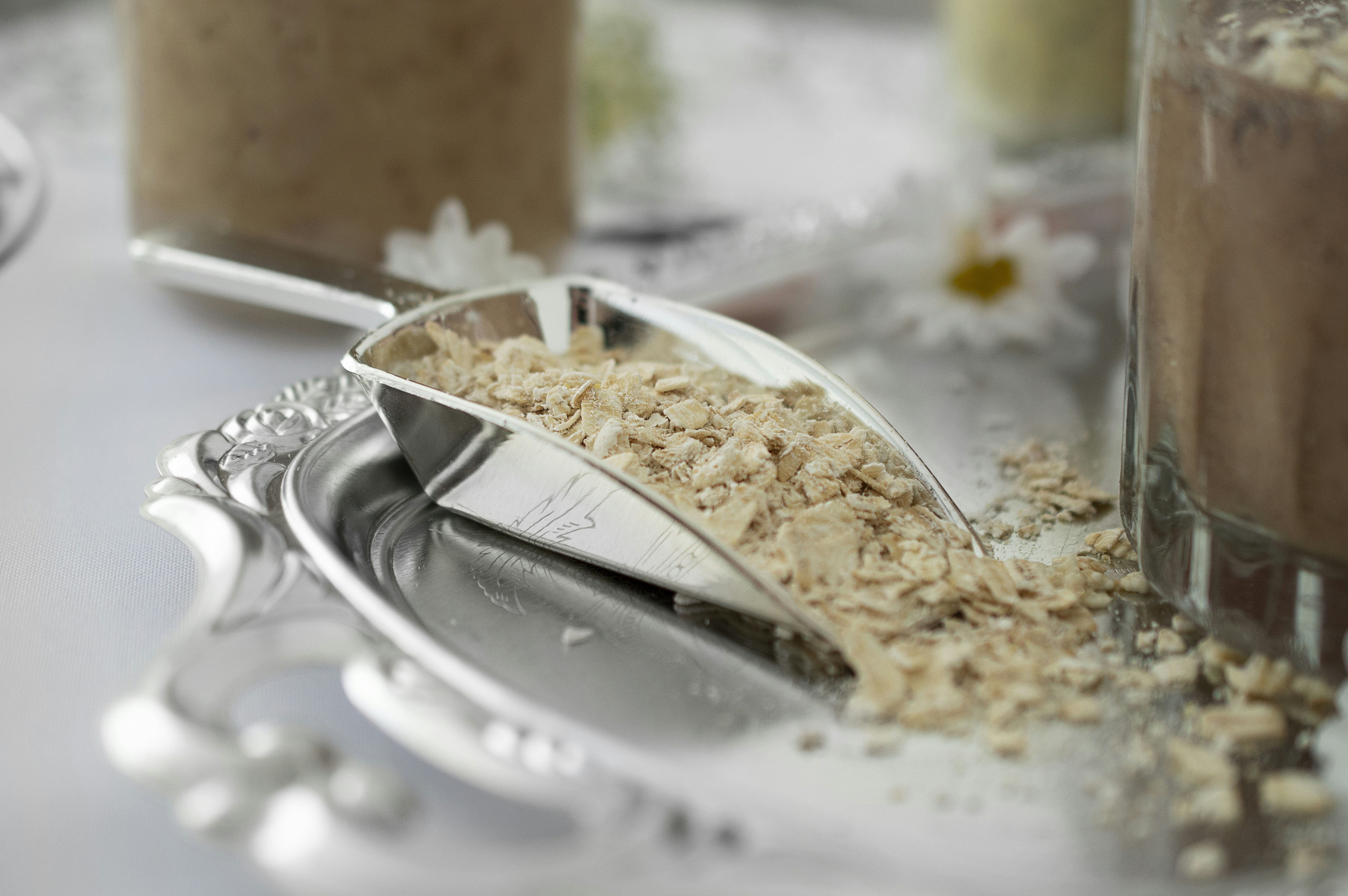 a spoon with some food in it on a table