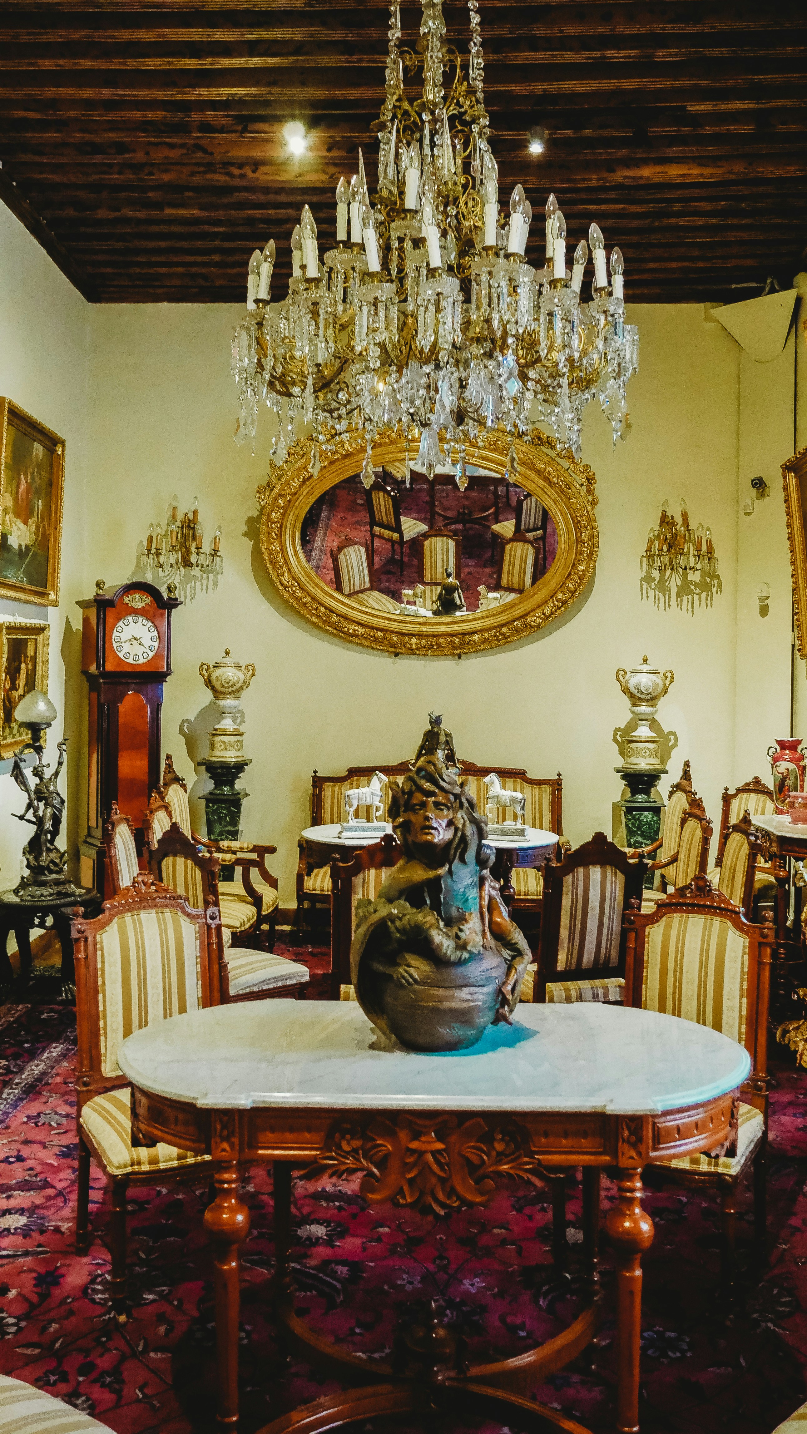 Dragon on Marble: An Antique Salon Beneath a Crystal Chandelier