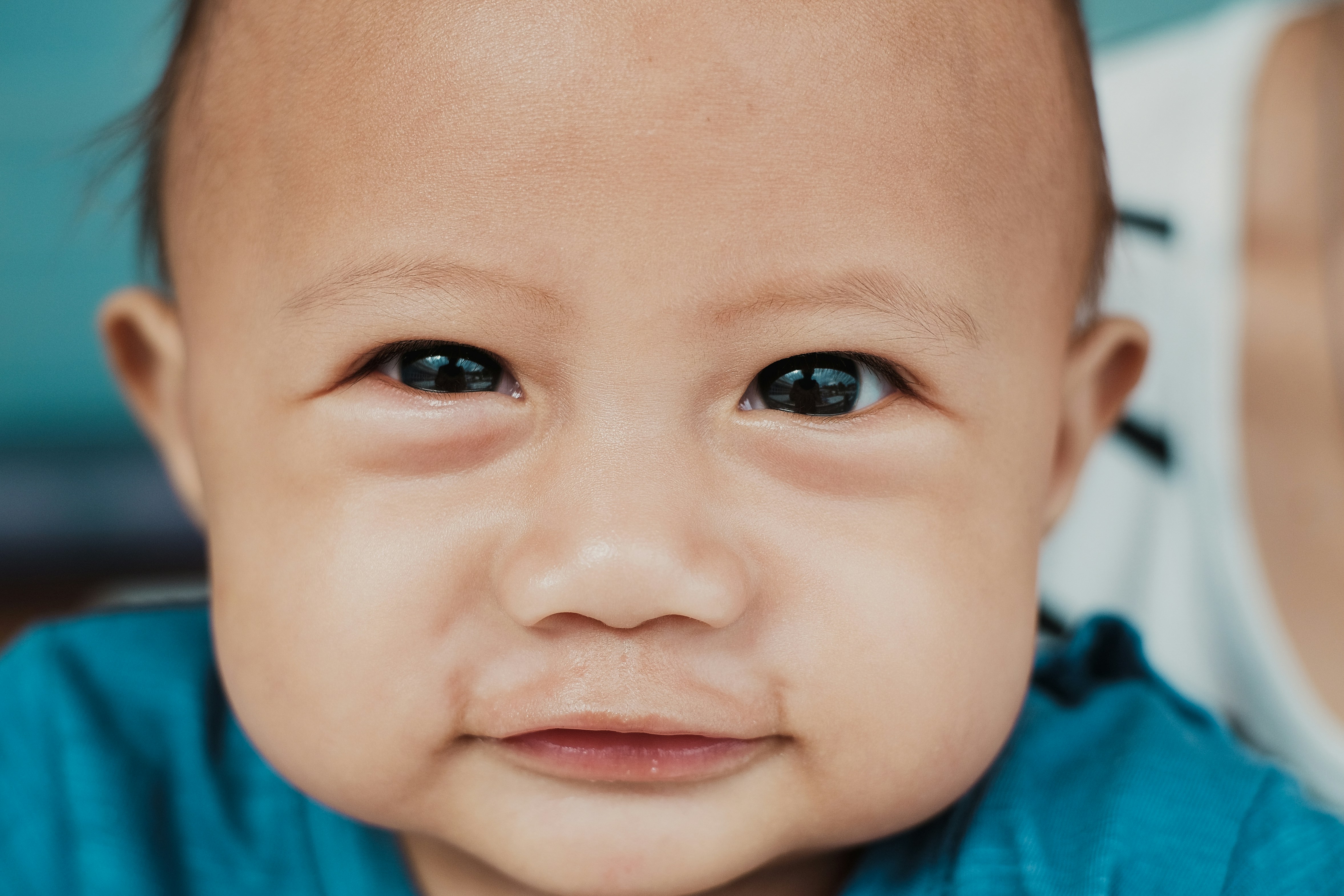 Baby wearing blue shirt smiling photo – Free Cute infant Image on Unsplash