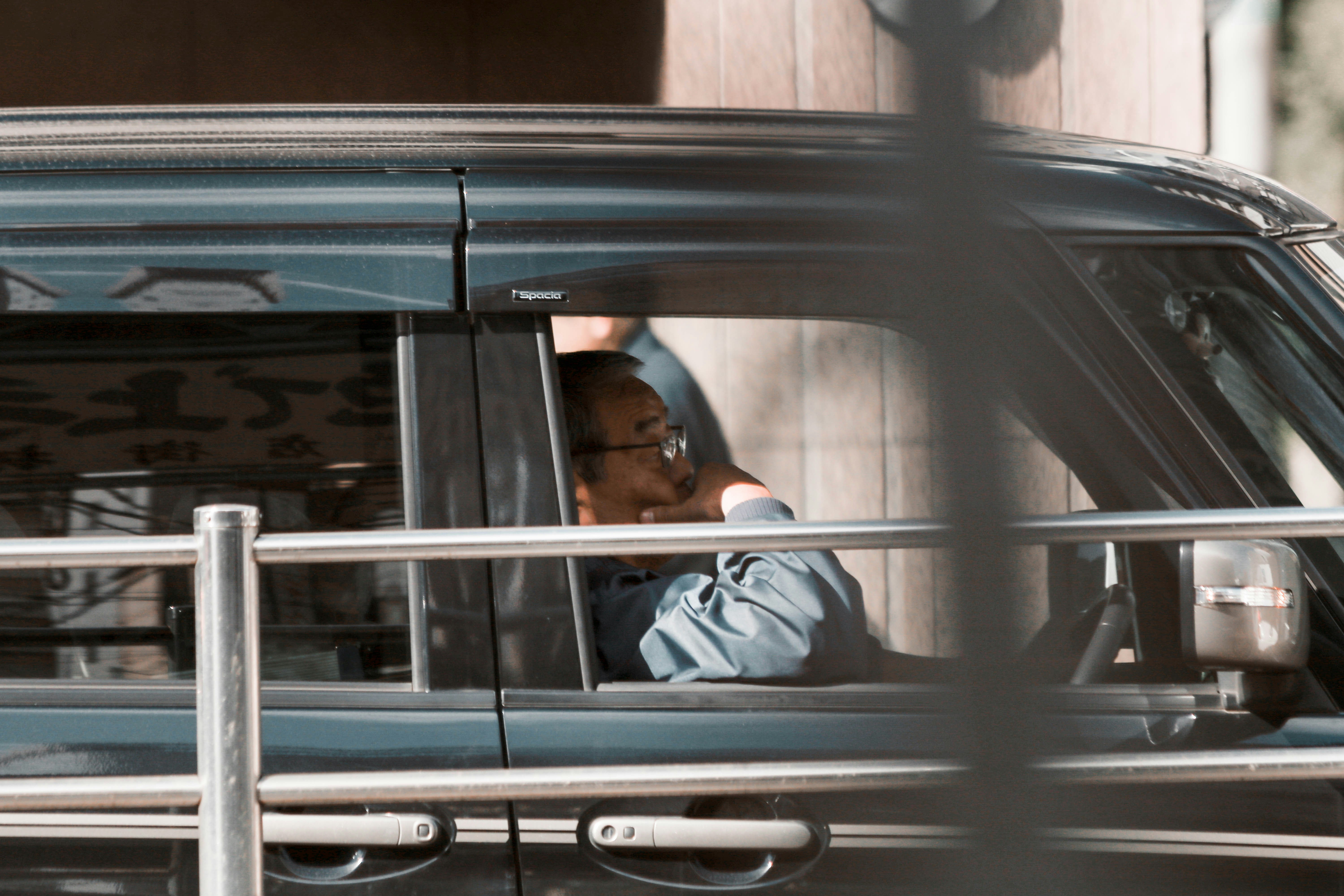 Shallow focus photo of man riding car photo – Free Grey Image on Unsplash