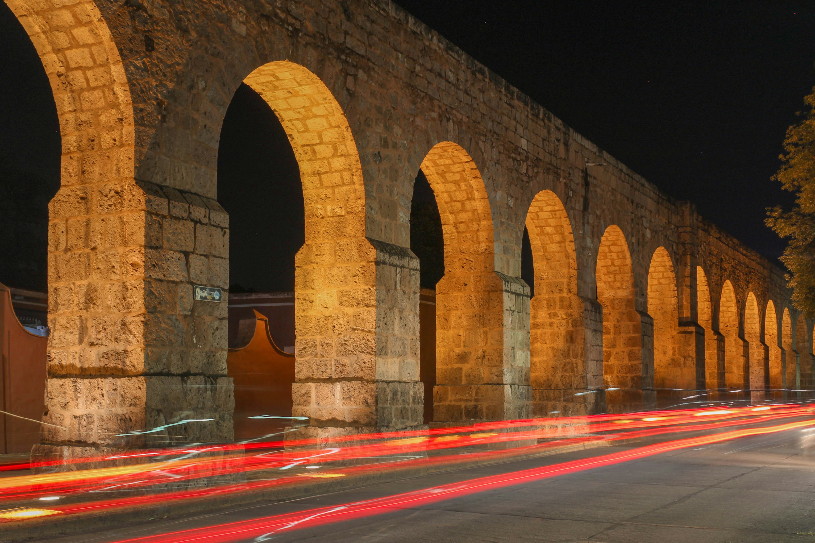 Moonlit Arches in Motion: Evening Traffic Traces at the Aqueduct