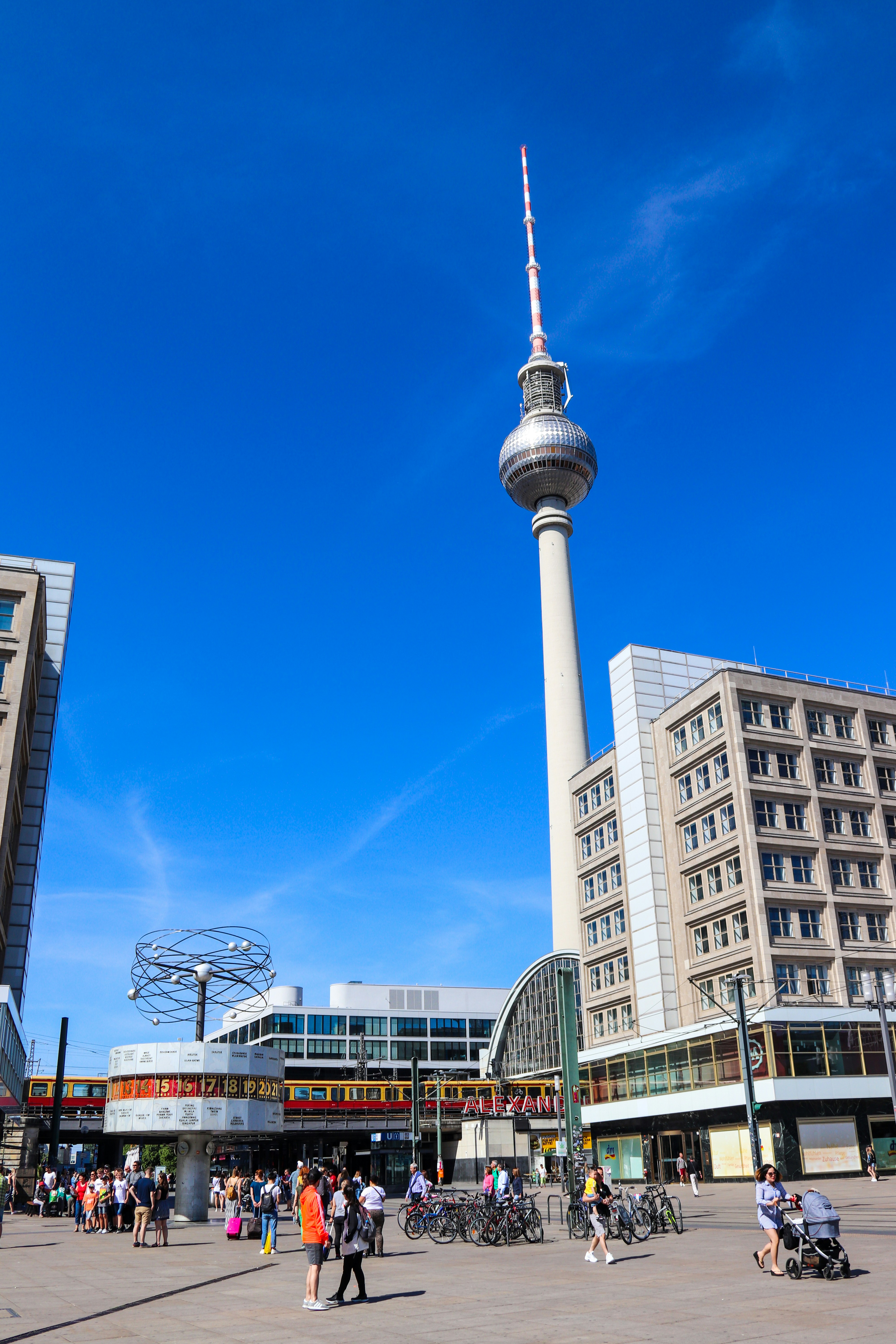 People walking near buildings during daytime photo – Free Blue Image on ...