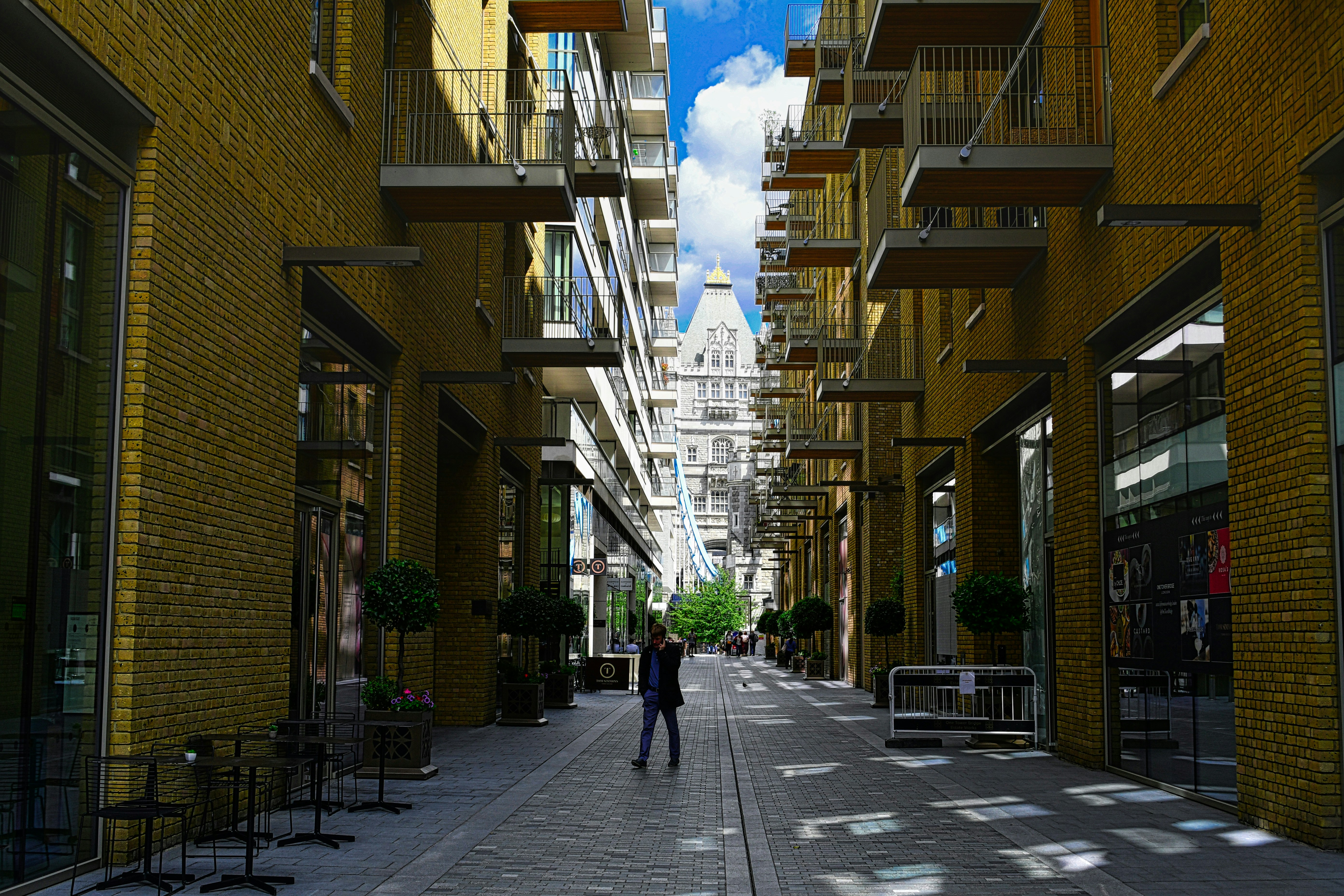 Person standing between buildings photo – Free #london Image on Unsplash