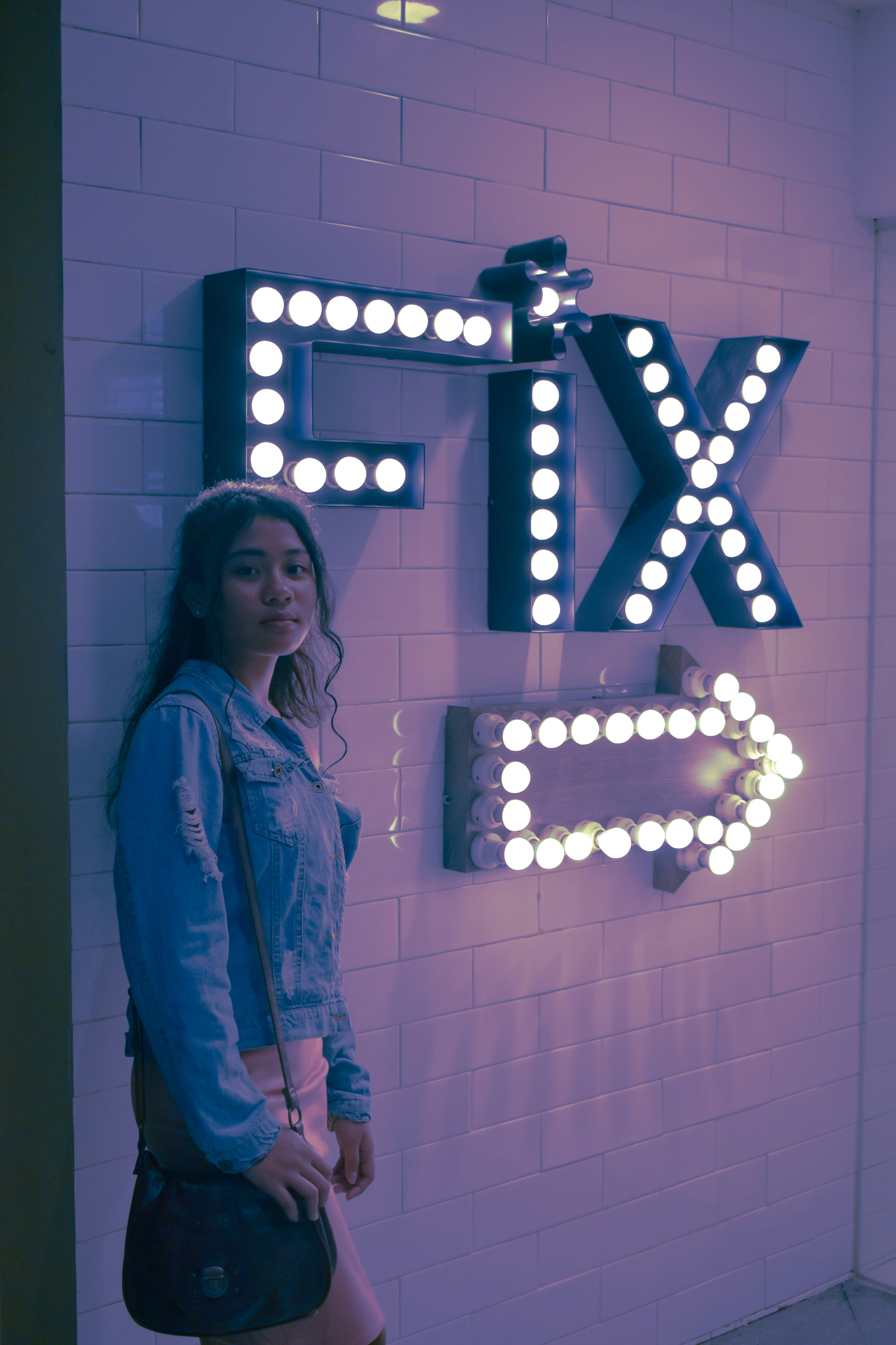 Woman standing beside marquee photo – Free Grey Image on Unsplash
