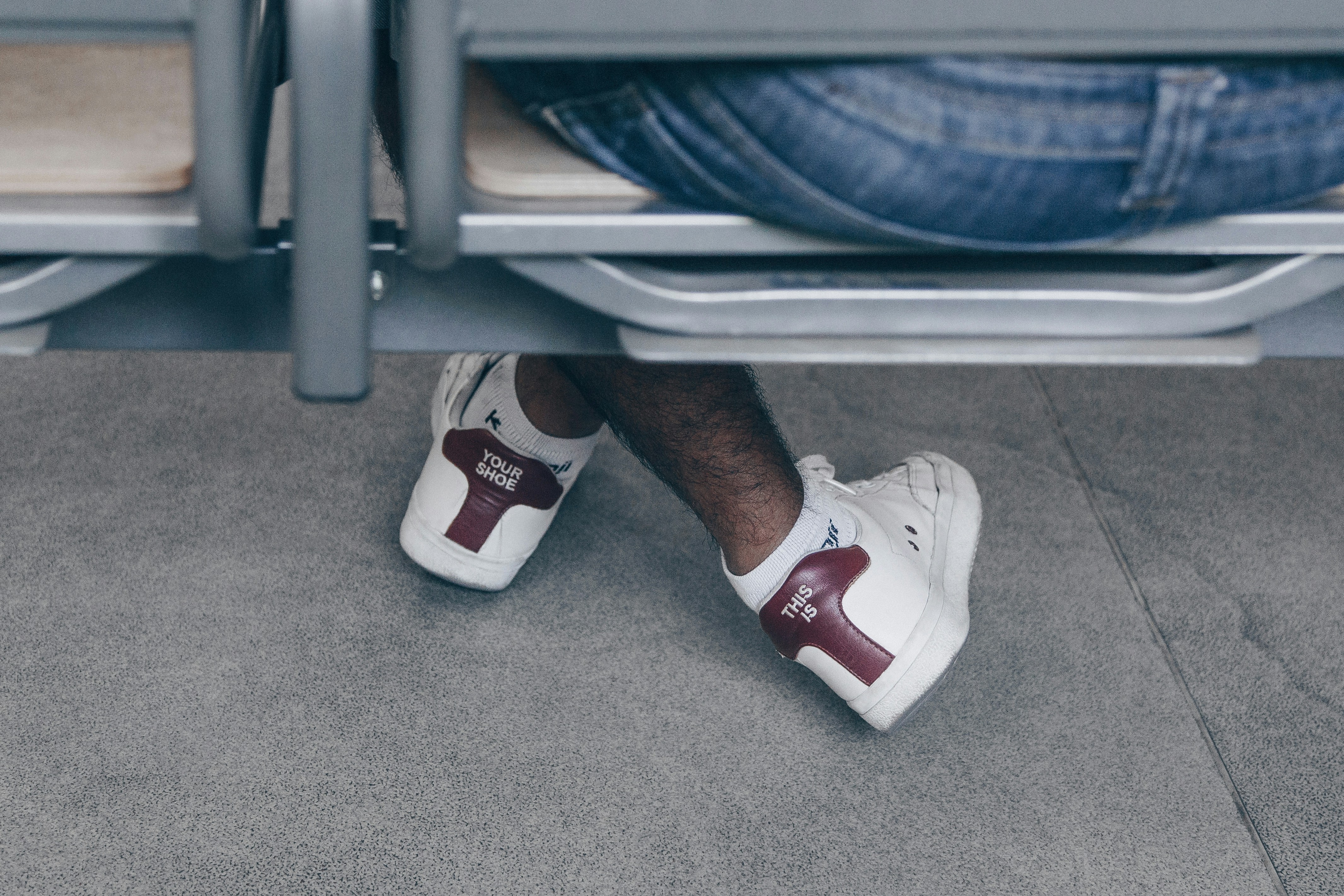 Under-Bench Sole Portrait: White Sneakers with Burgundy Accents