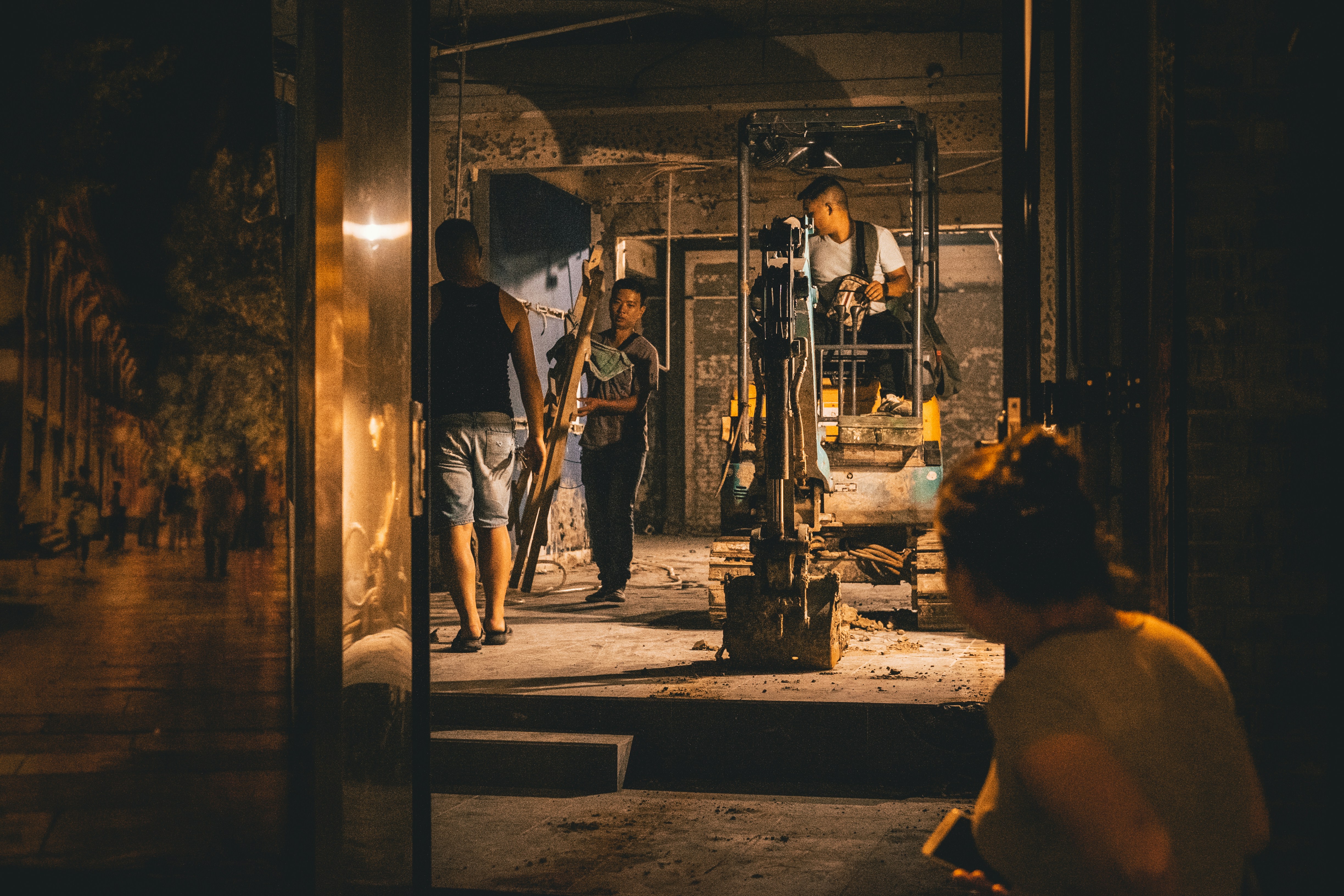 Shallow focus photo of man riding front loader photo – Free Human Image ...