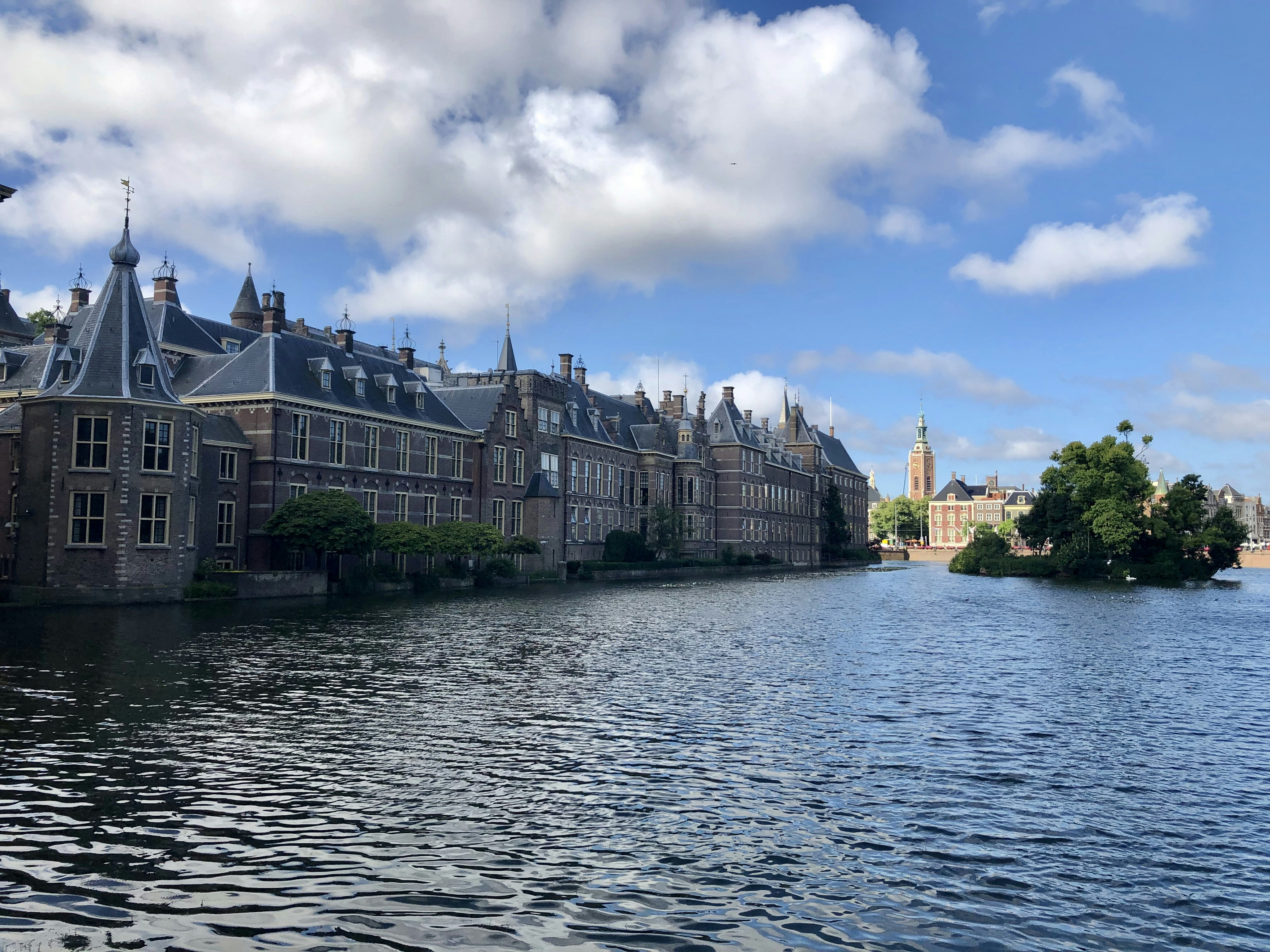 Gray and blue house beside body of water photo – Free Grey Image on ...