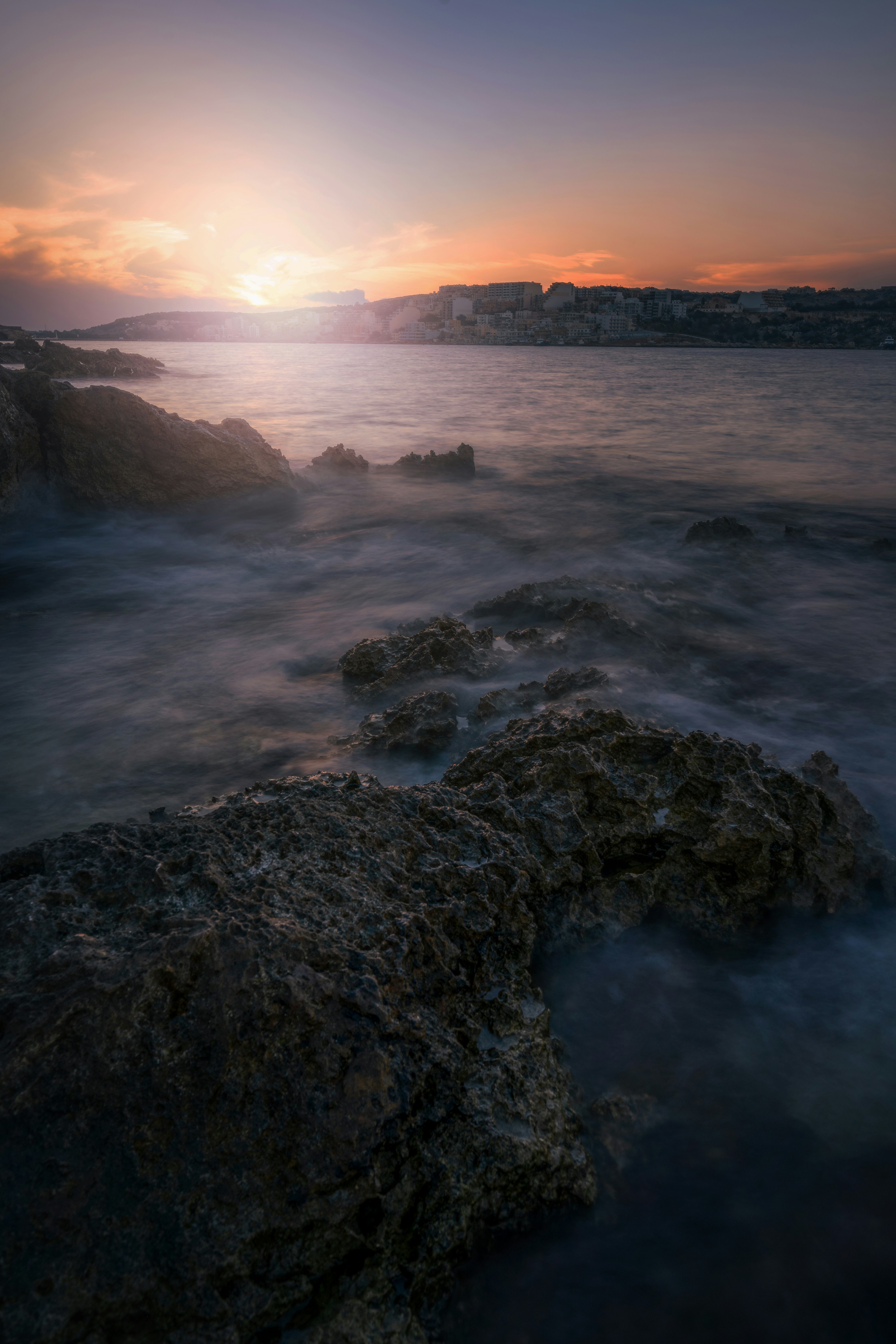 "Calming Sun"  -  Such a calm looking photo, after such a hurry to get there in time for the sunset. Would you have expected, just by looking at this shot that I had to run from my hotel room all the way through the city to catch this shot?