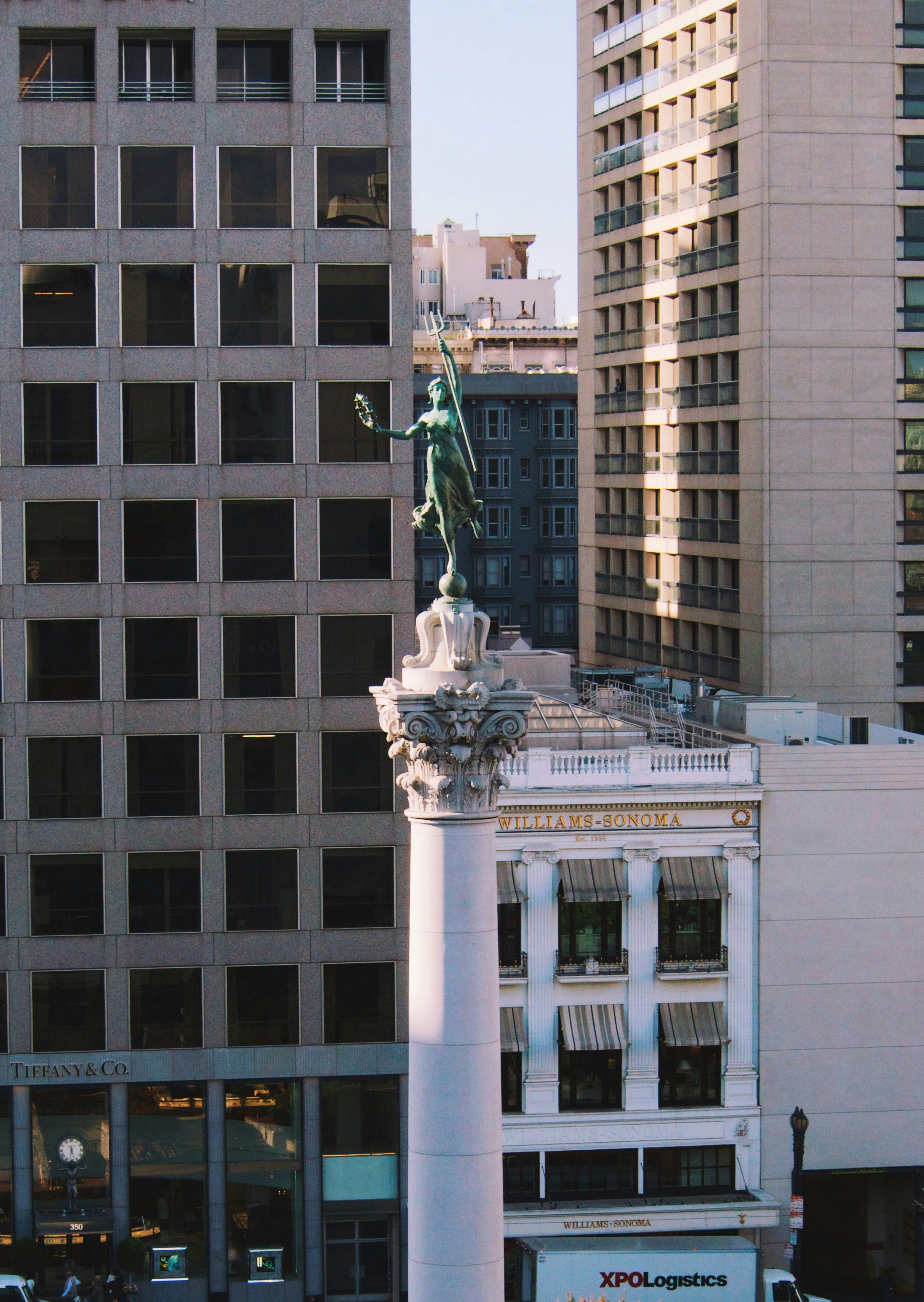 teal female statue during daytime photo – Free Building Image on Unsplash