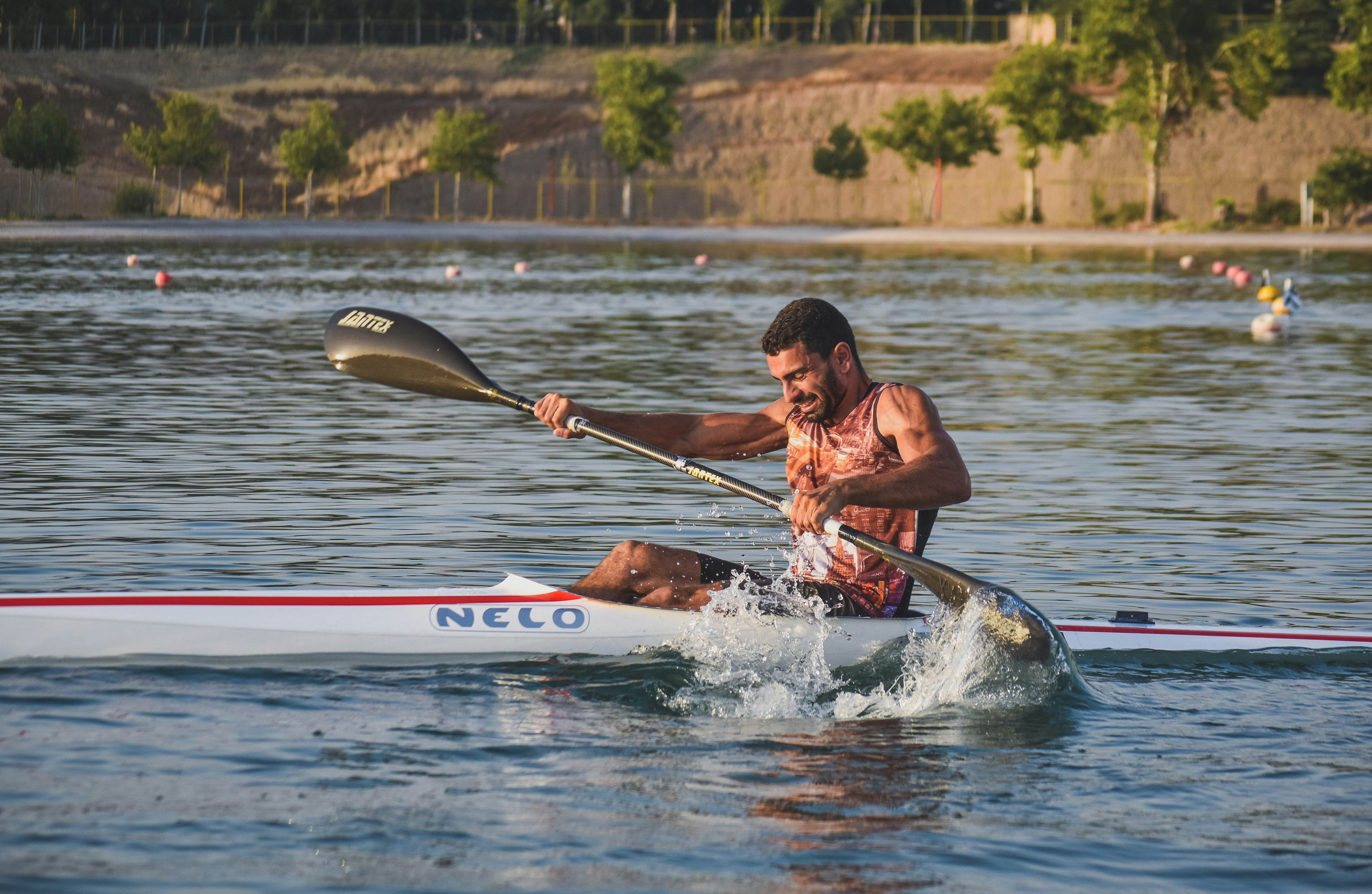Man riding kayak on sea photo – Free Human Image on Unsplash