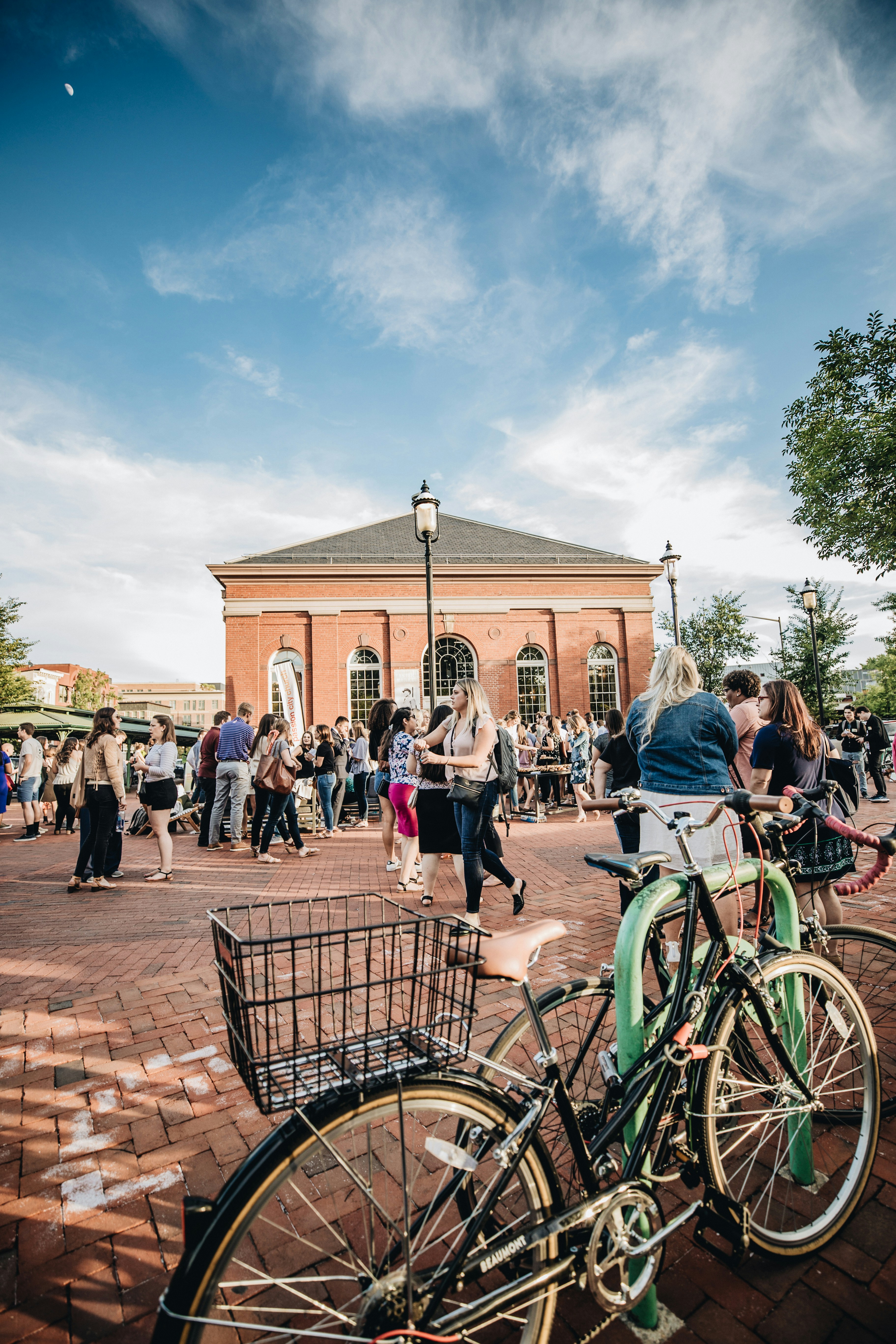 People gather at a local market in Washington, DC