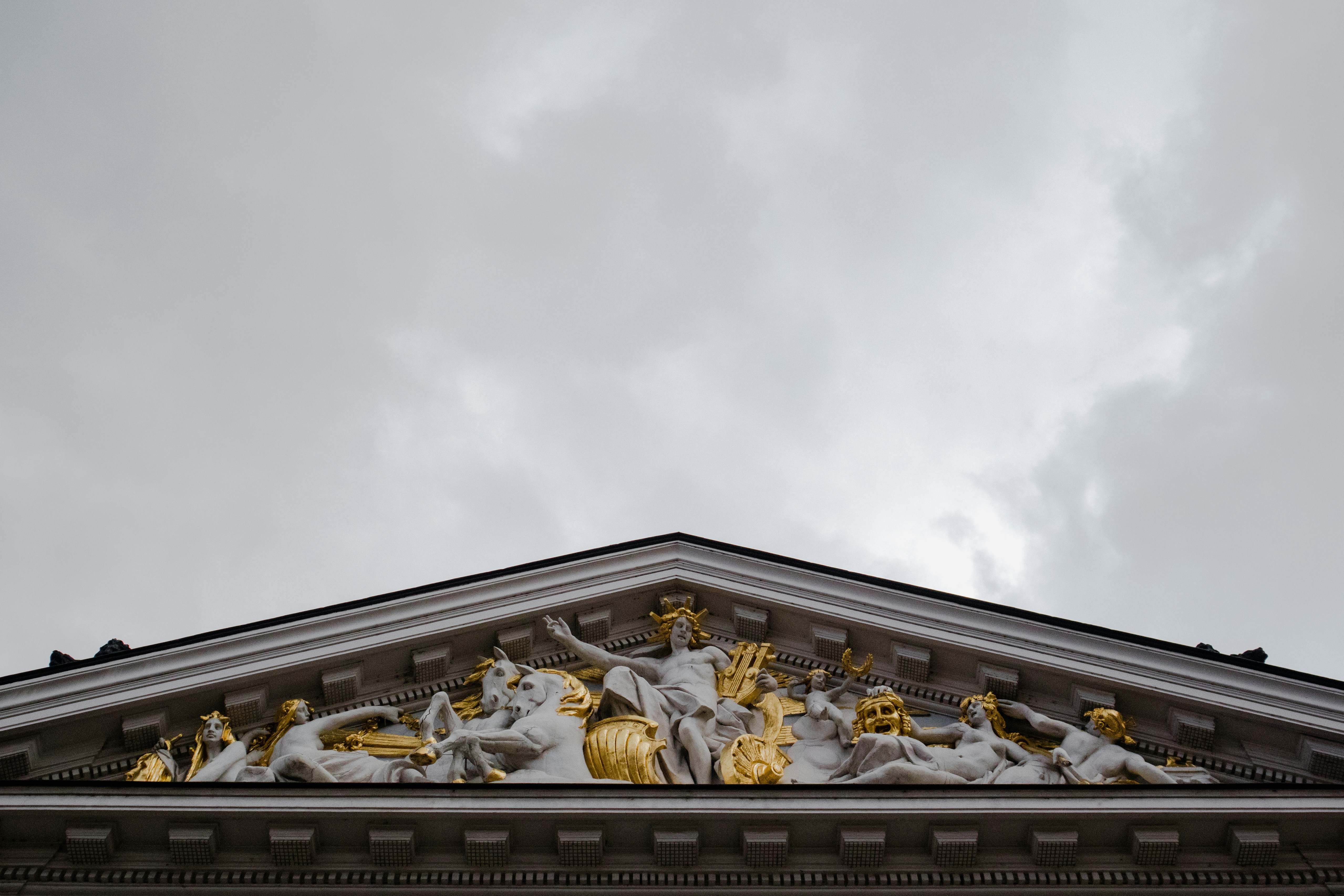Gilded Elegance Against a Brooding Sky