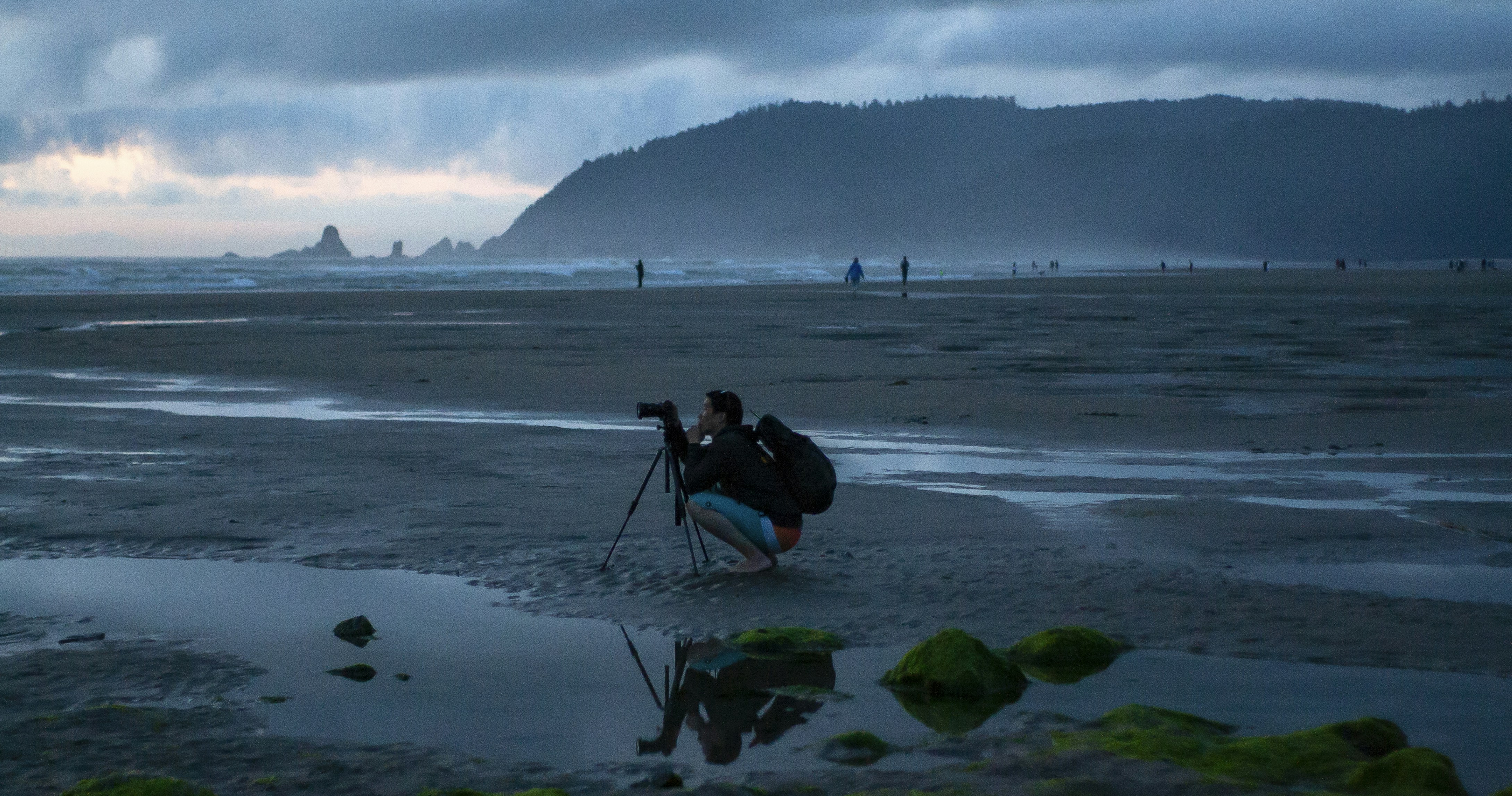 Man squatting in front of camera photo – Free Human Image on Unsplash