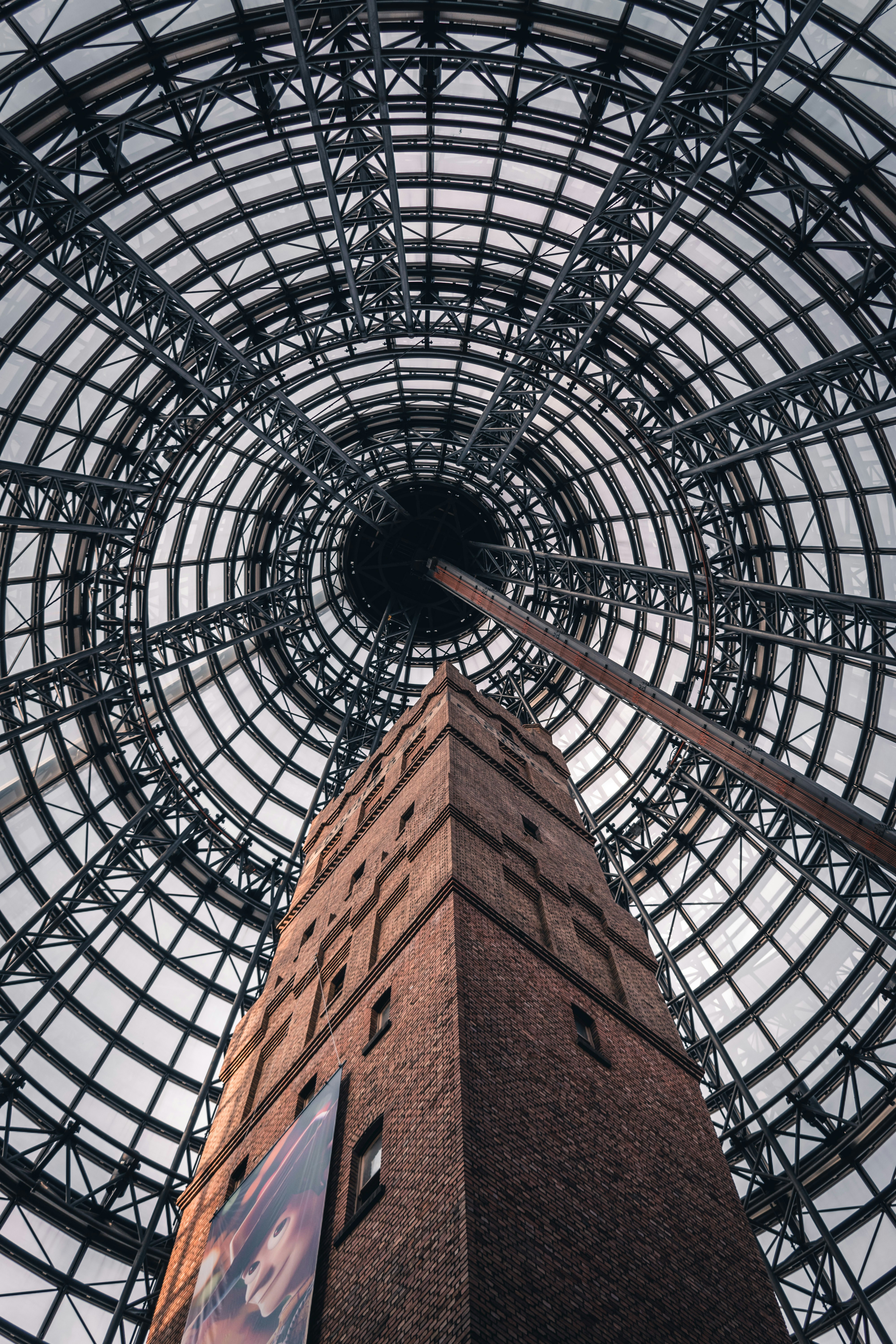 Obelisk in the Ring: Brick Tower under a Geometric Dome