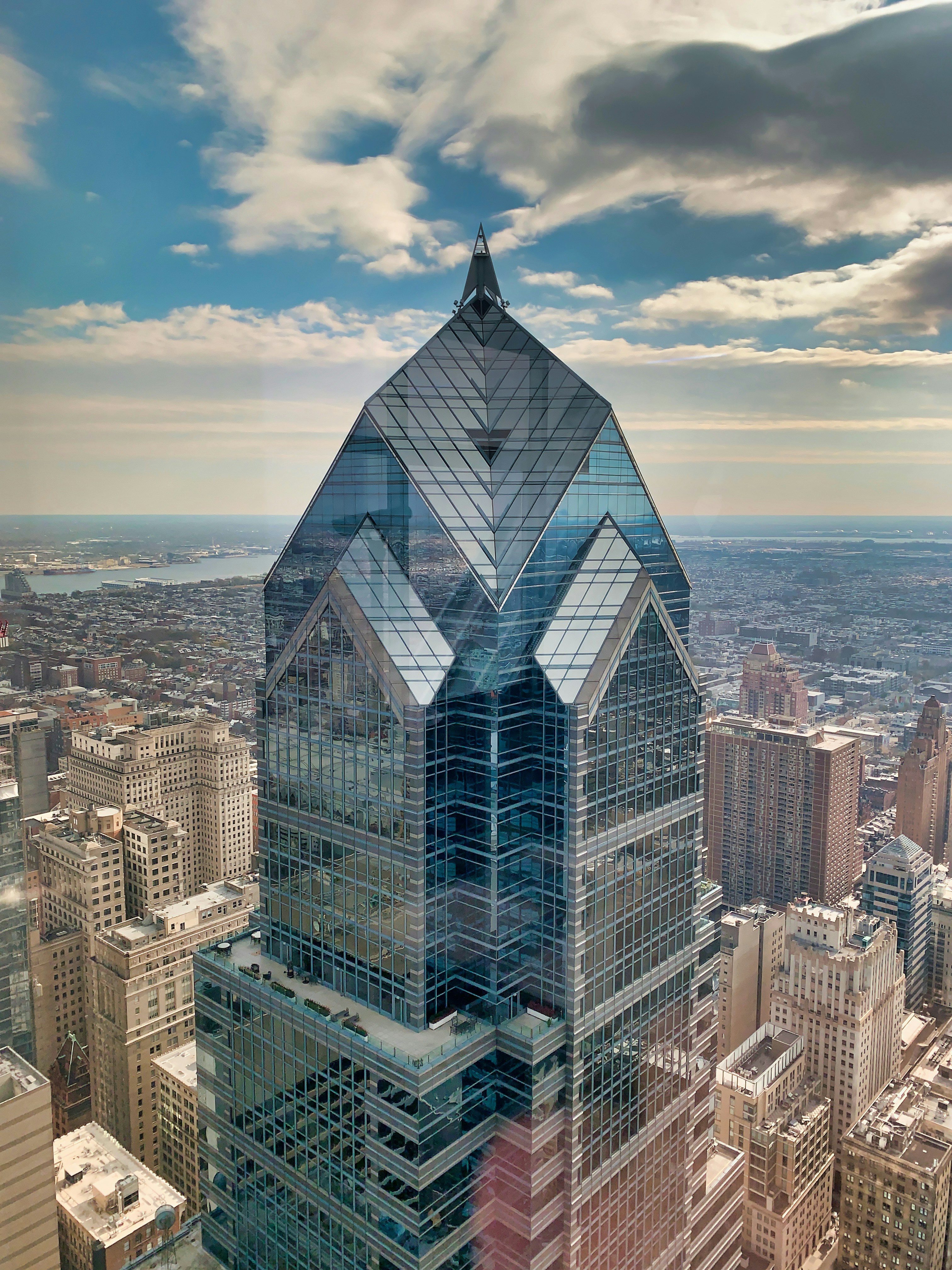 The Crowned Peak: A Skyward Facade Towering Over a City