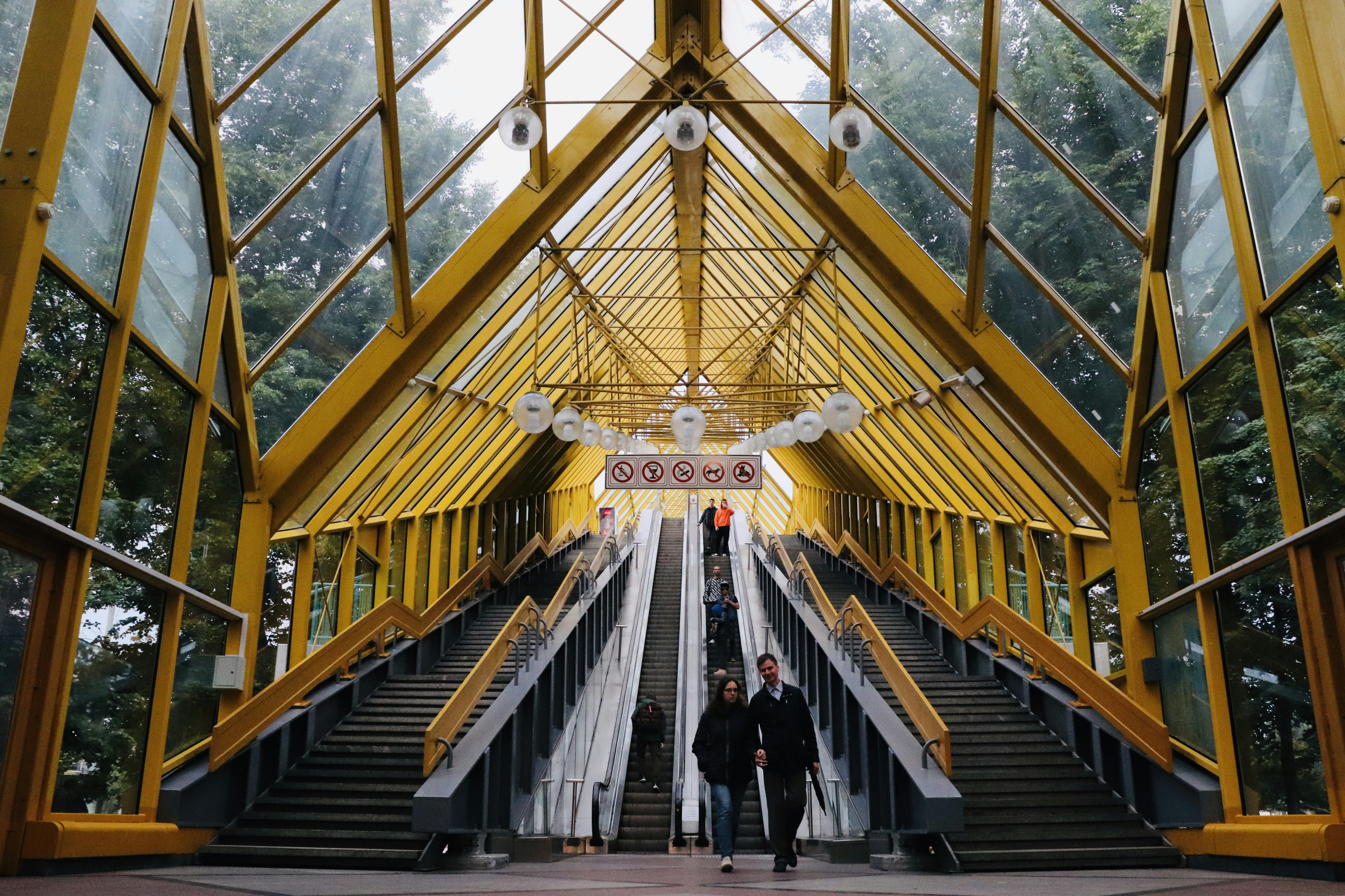 Symmetry in Motion: Urban Escalator Elegance