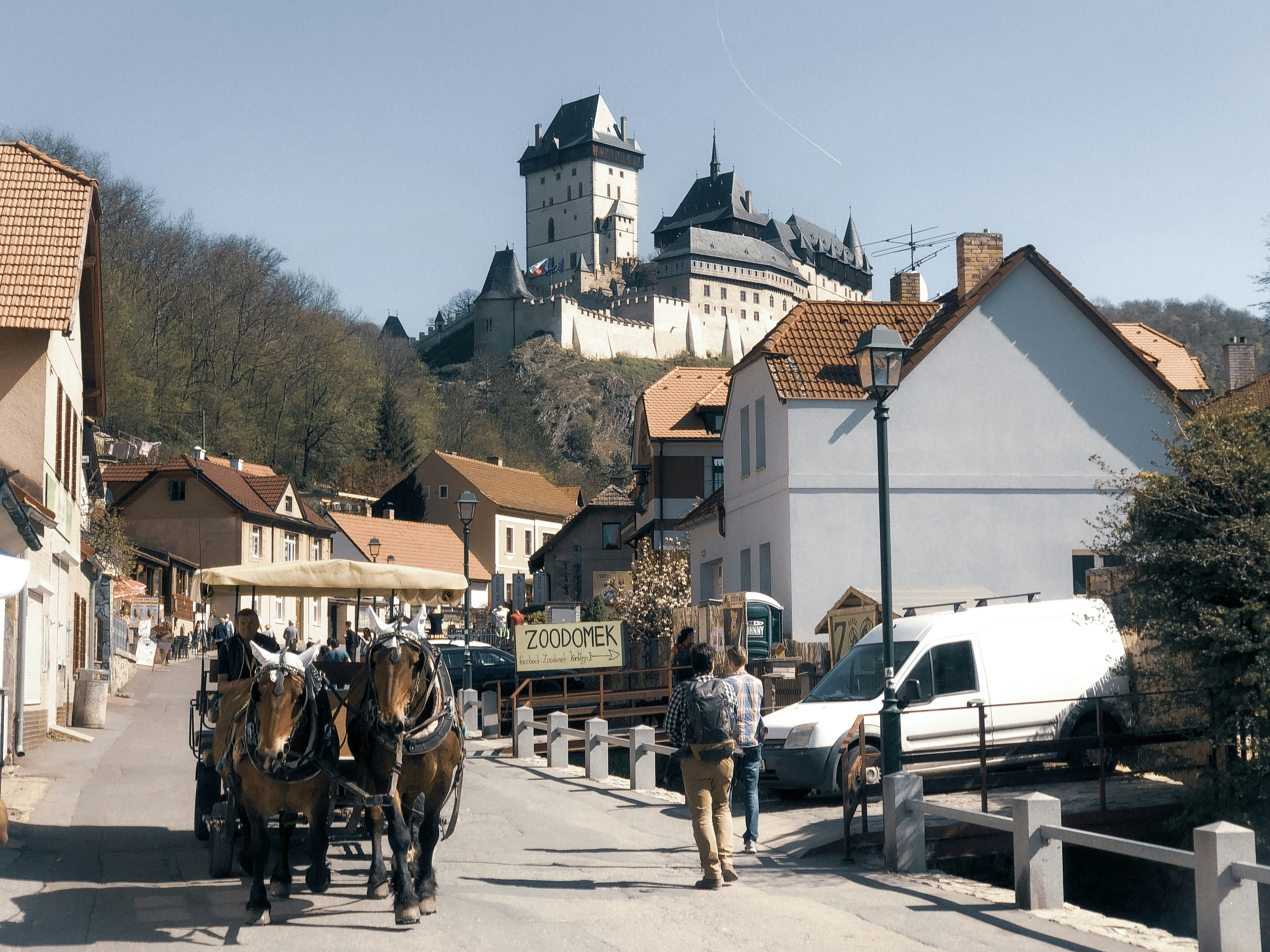Horse-drawn Parade Through a Medieval Town
