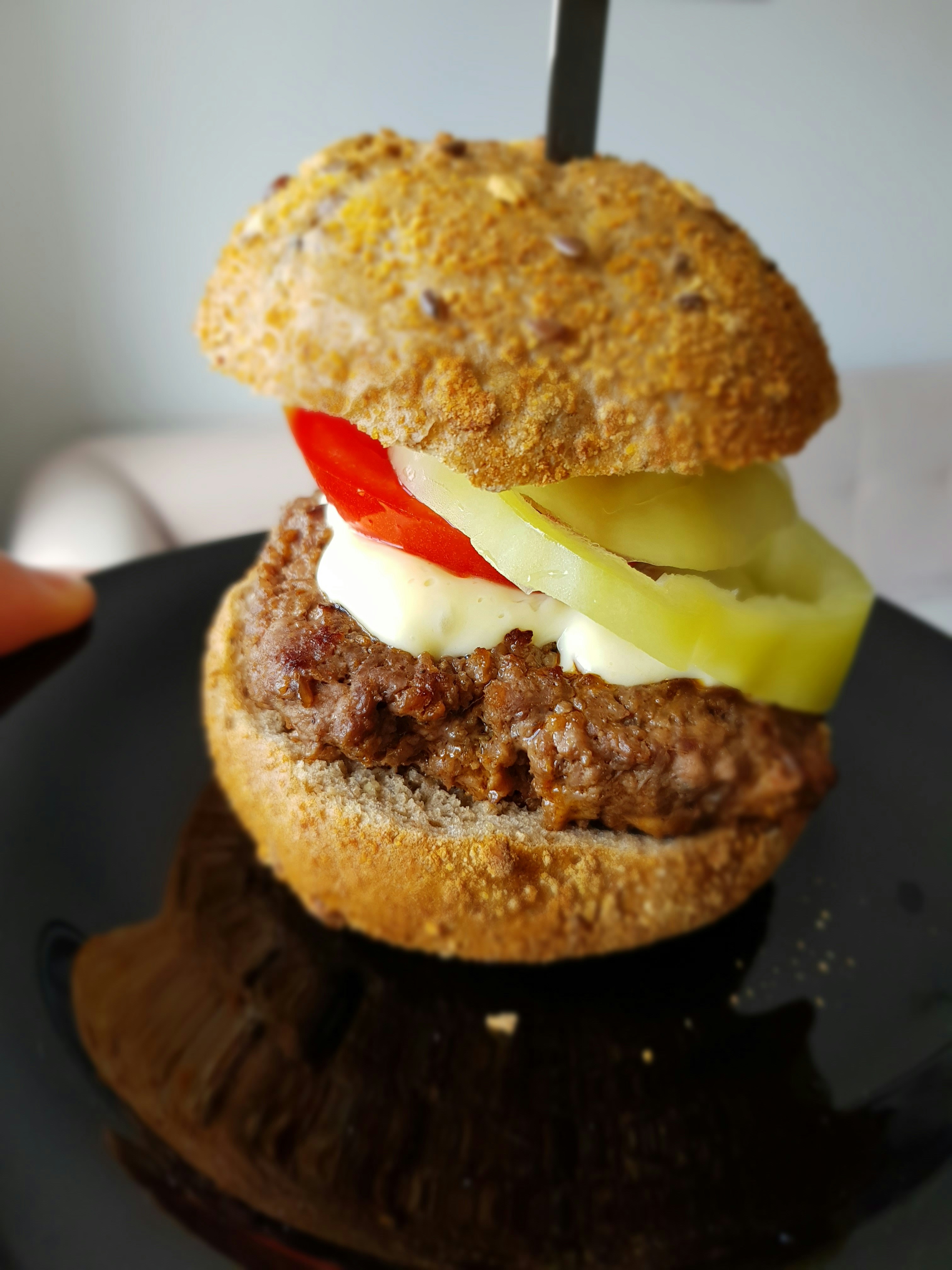 Burger on black surface photo – Free Food Image on Unsplash