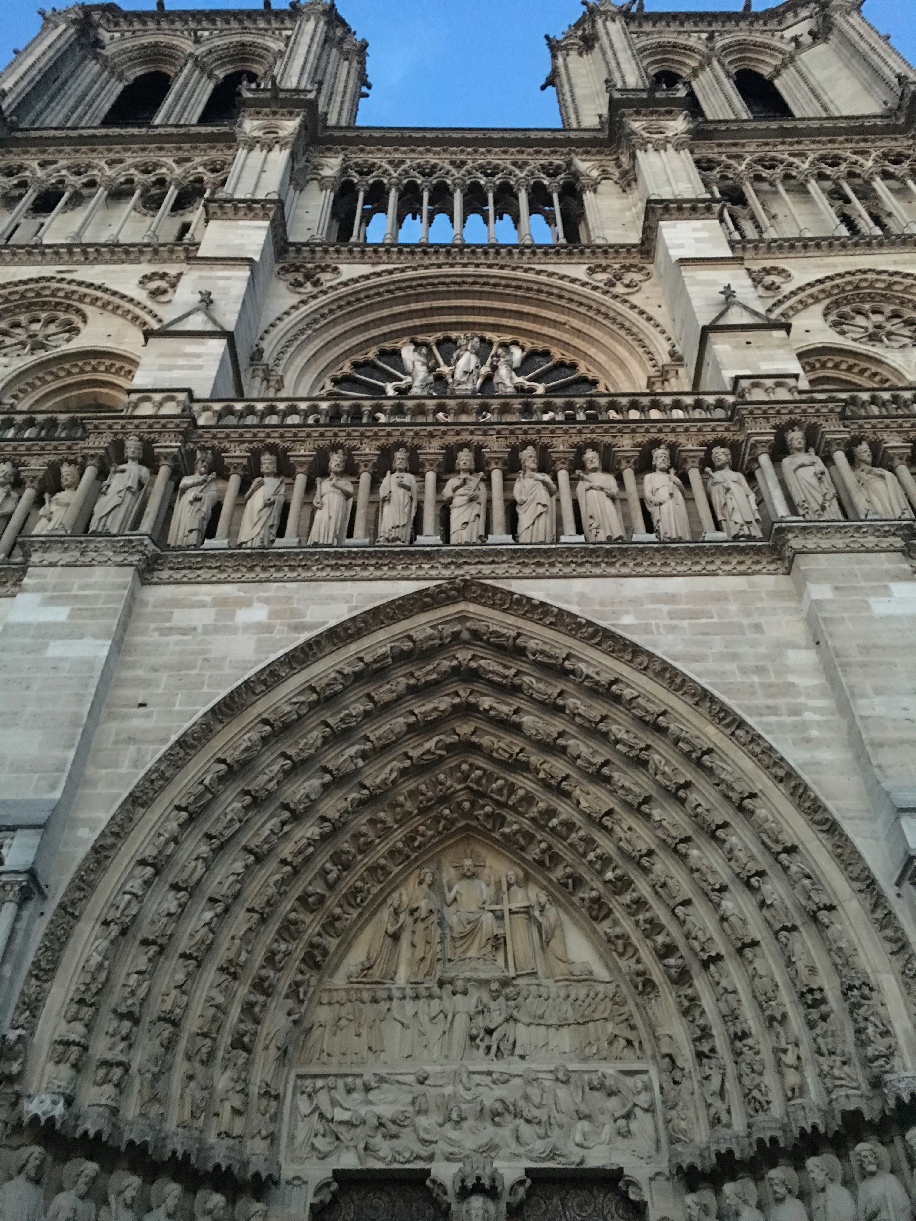 Stone Choir Portal: An Intricate Gothic Doorway of Figures