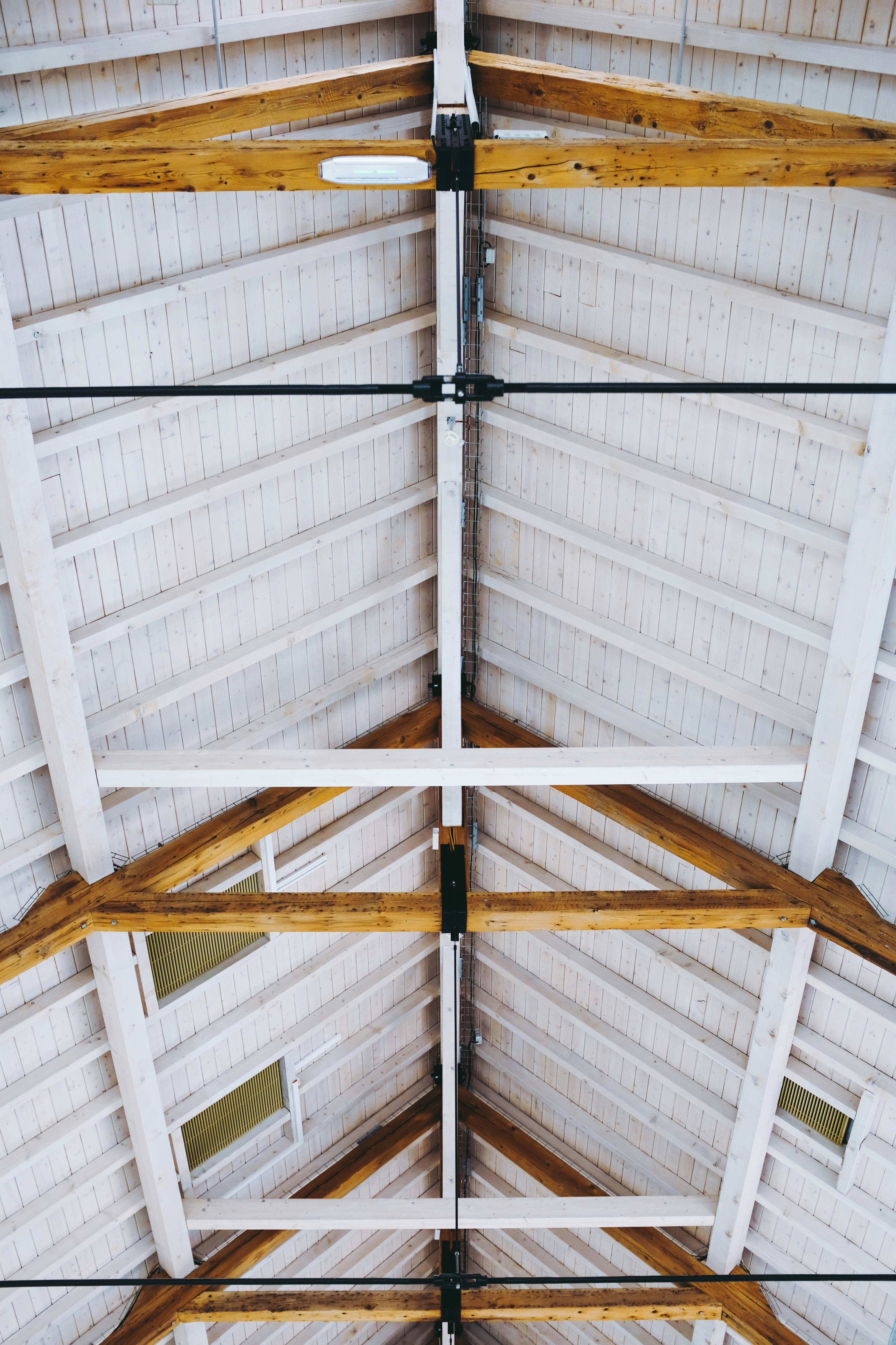 Timber Vaults in White: A Geometric Ceiling Portrait