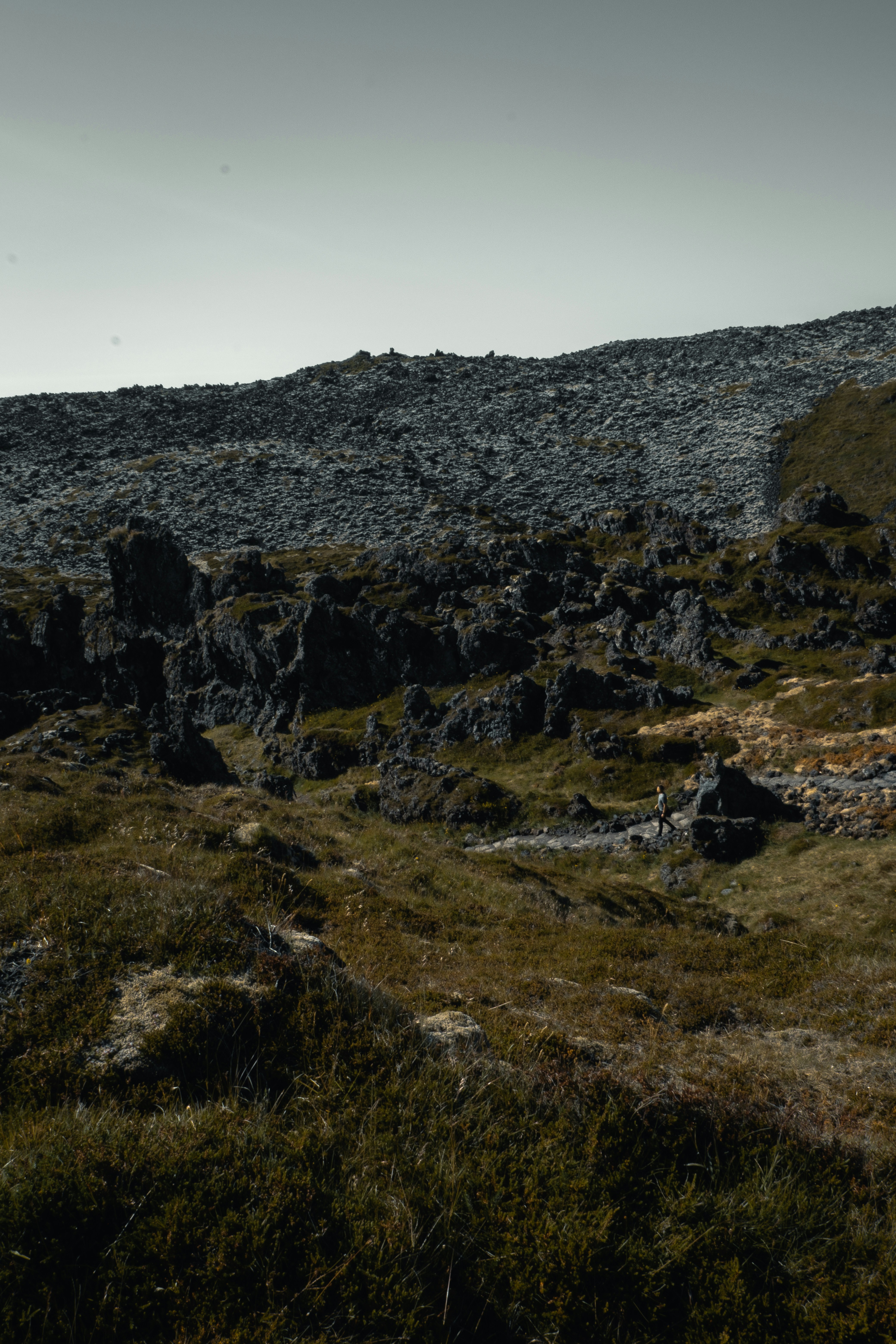 Grey rocky mountain under grey sky photo – Free Nature Image on Unsplash