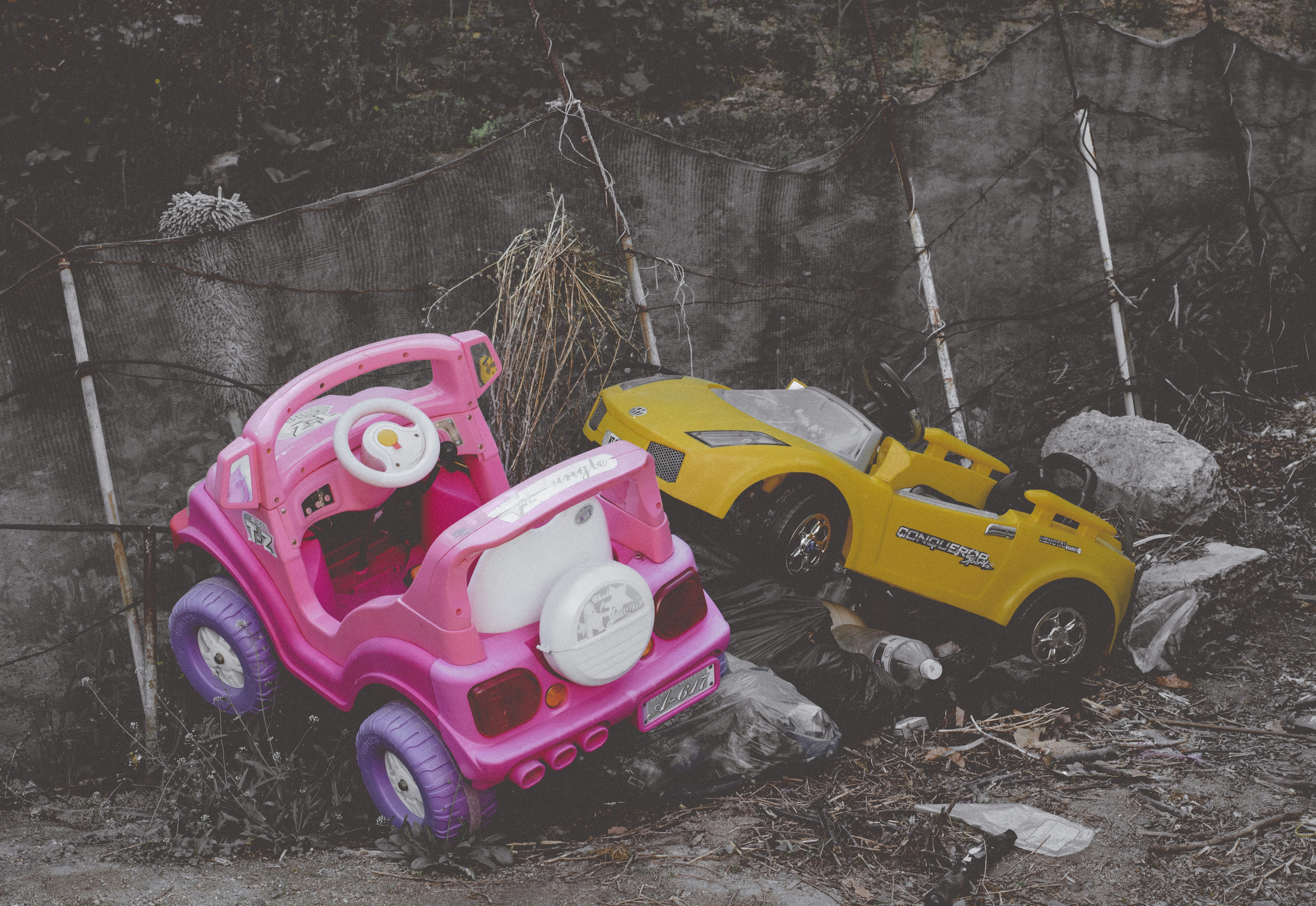 Children's two pink and yellow ride-on vehicles photo – Free Machine ...