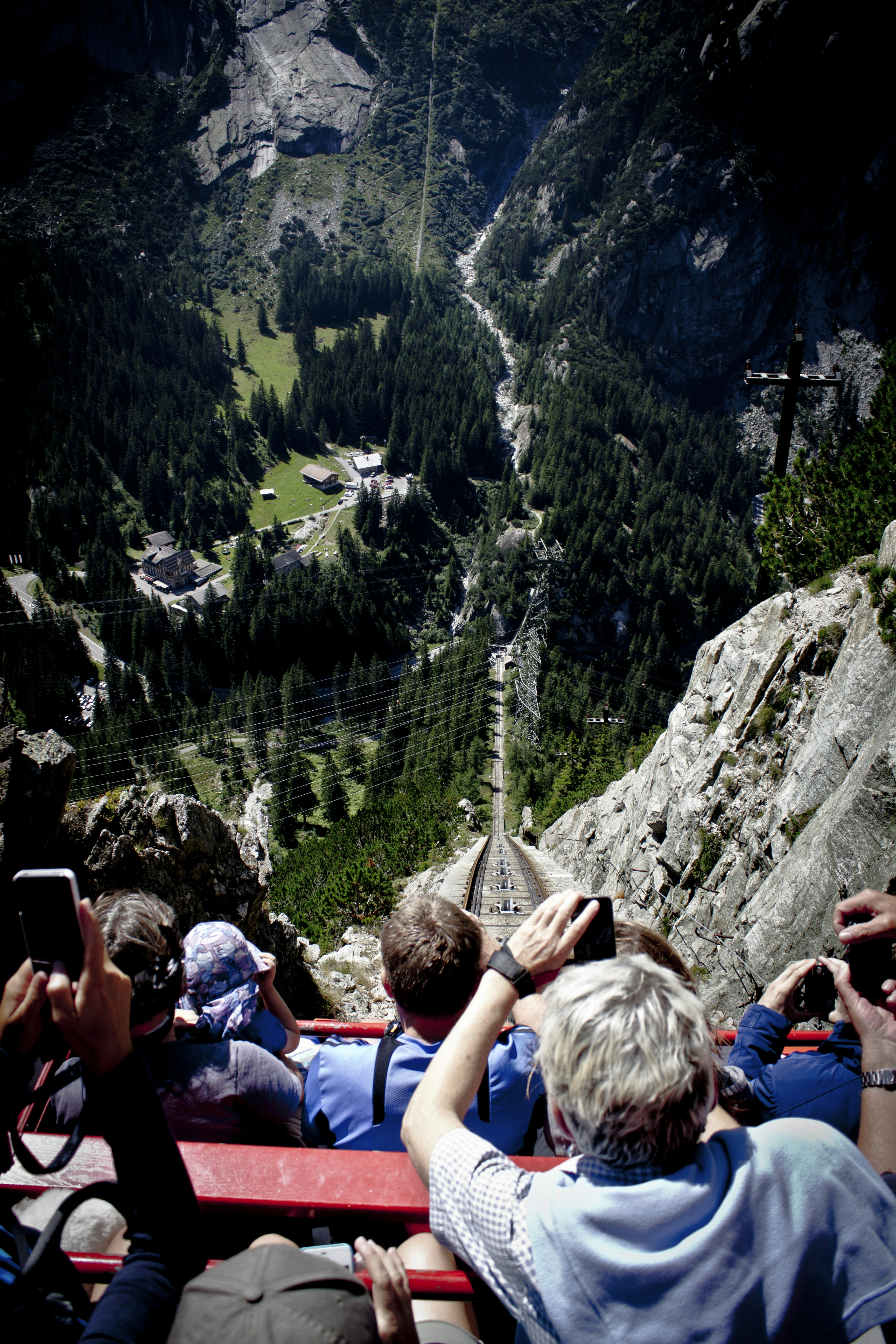 Cable Car Ascent: A Mountain Village View from a Front-Row Ride